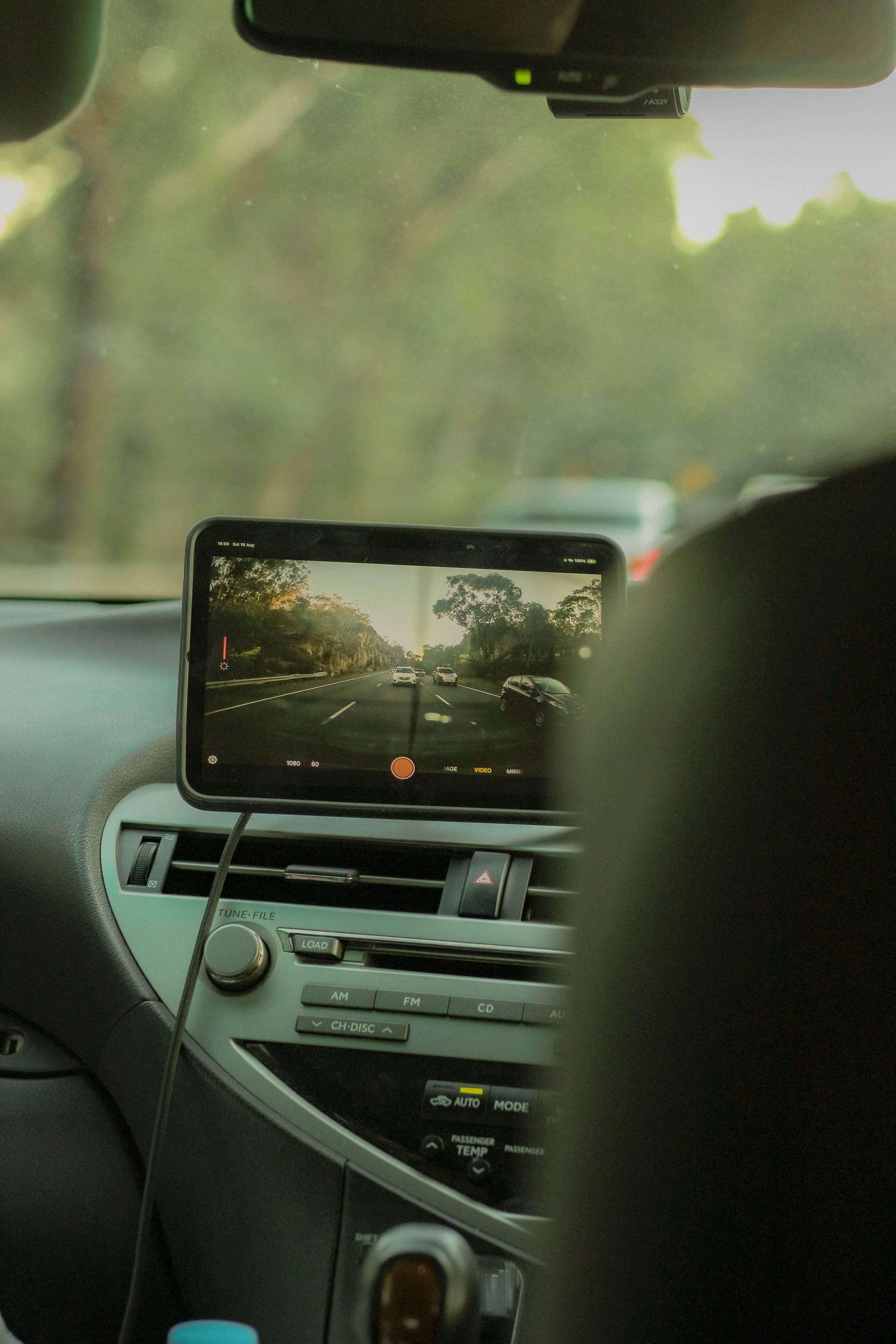 Tablet displaying gps navigation on car dashboard. photo – Free ...