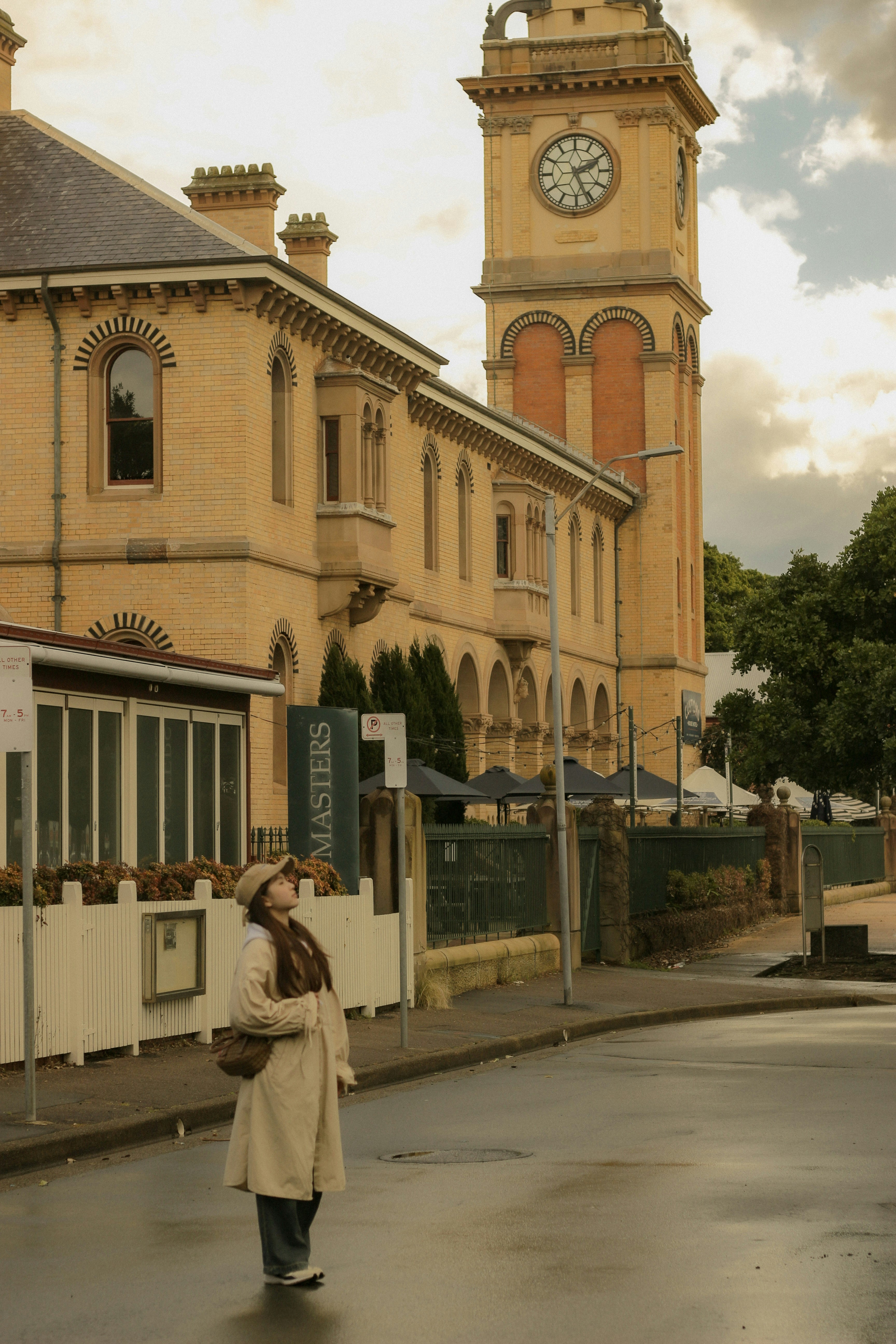 Clocktower and Quiet Street: A Pale-Orange Townscape