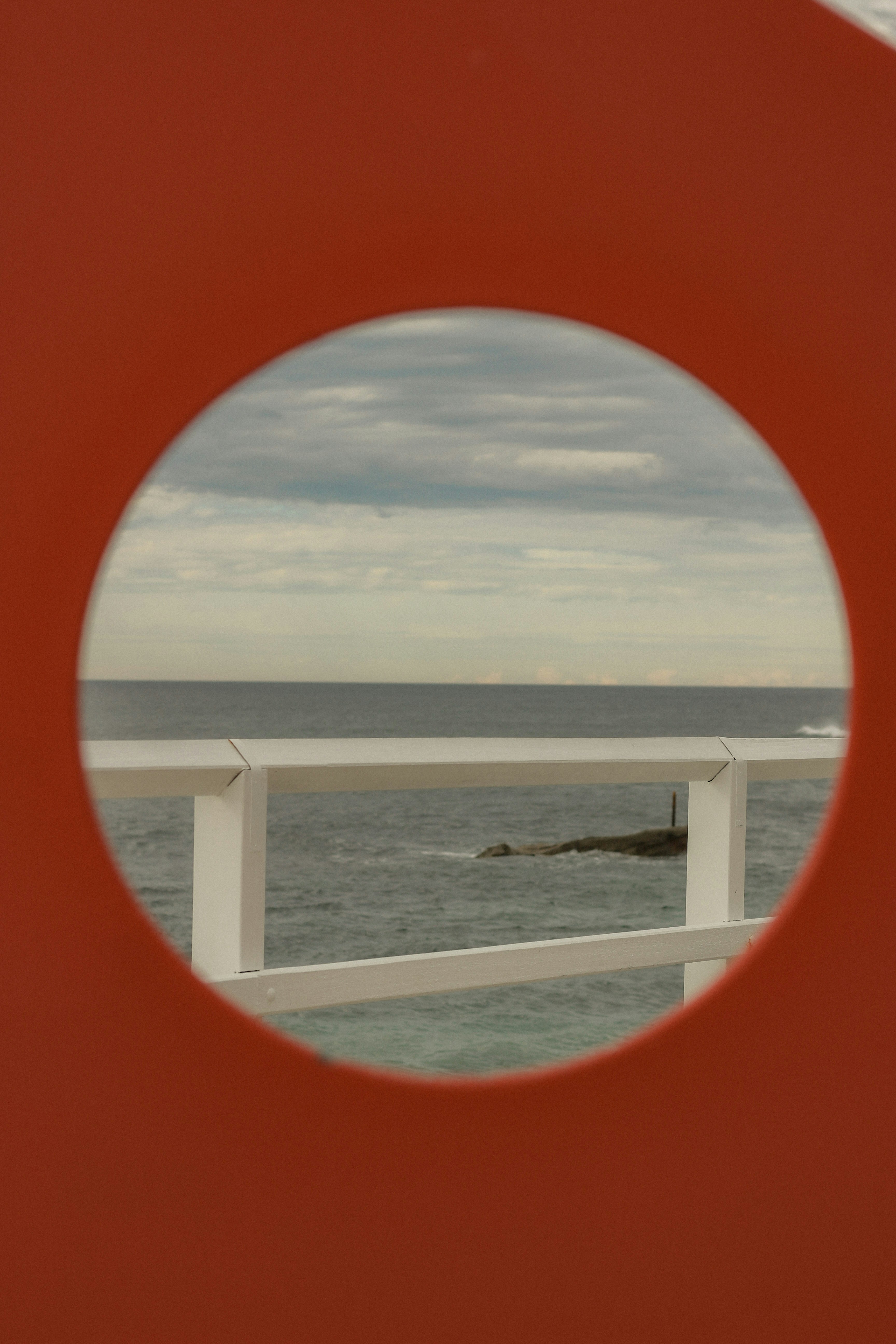 Circle of Sea: A Red Portal to the Horizon