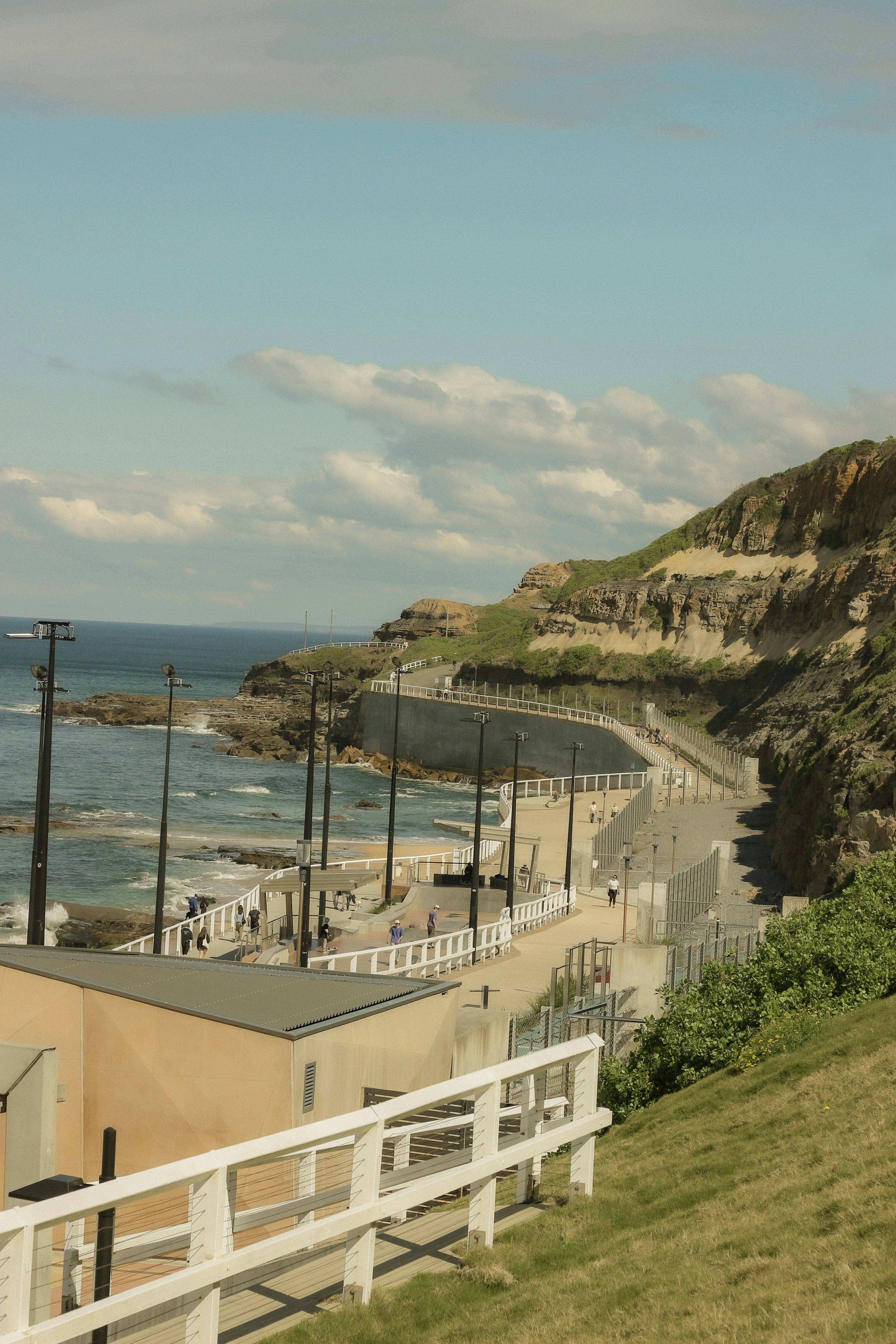 Seaside Boardwalk Winding Along Cliffside Path