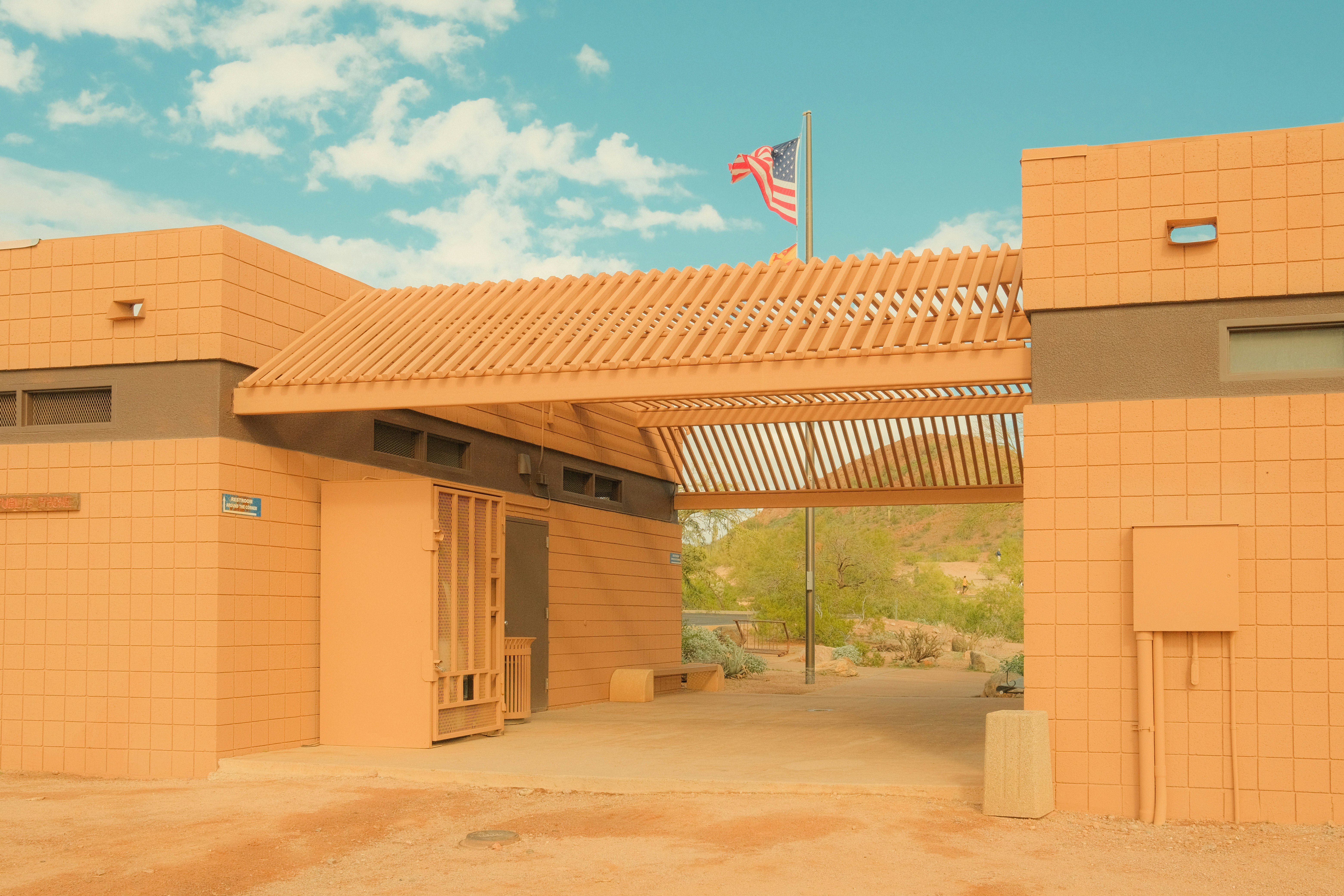 Desert Gate Under a Waving Flag