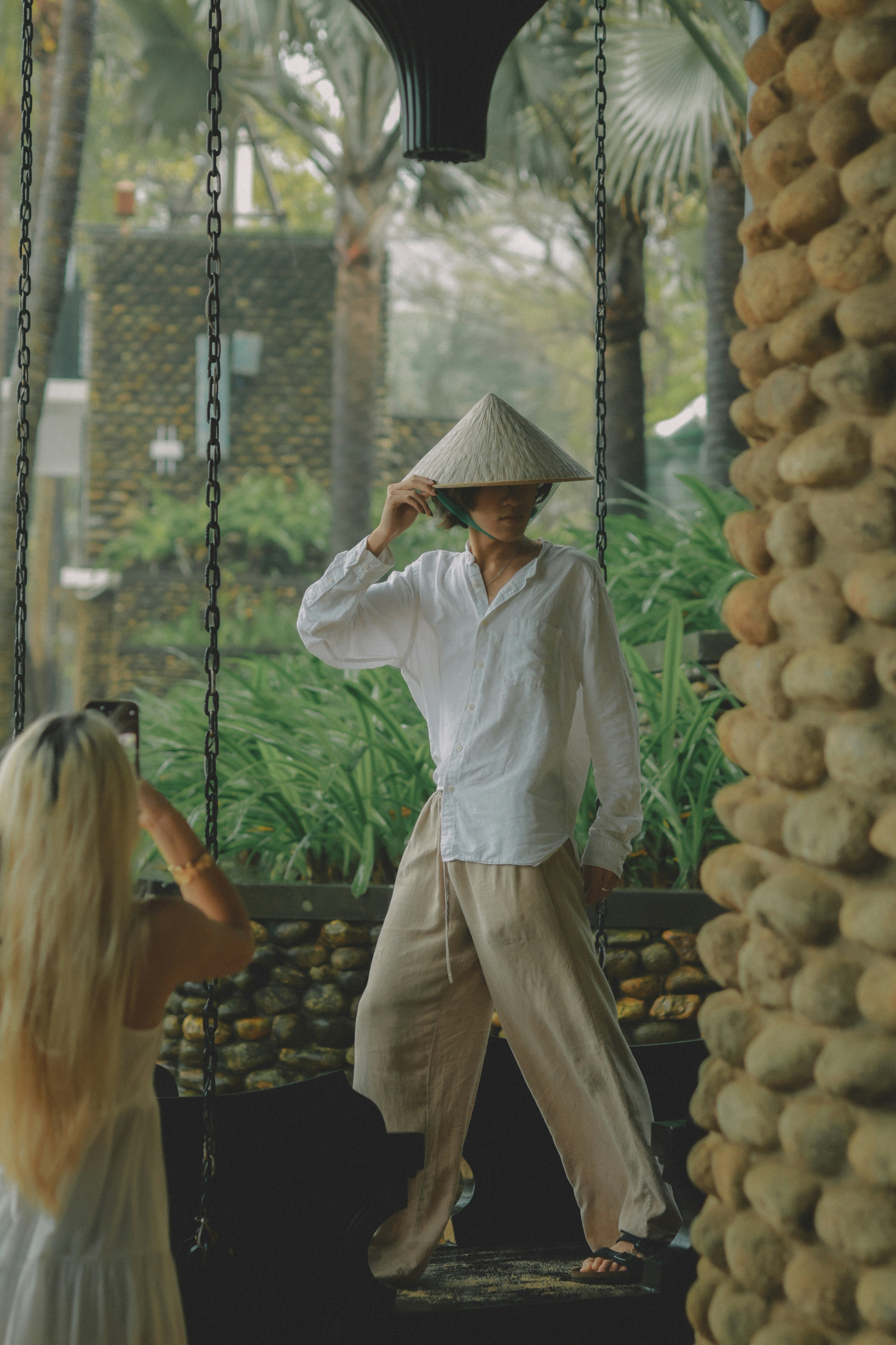 Conductor of Quiet Motion under a Wind-kissed Roof
