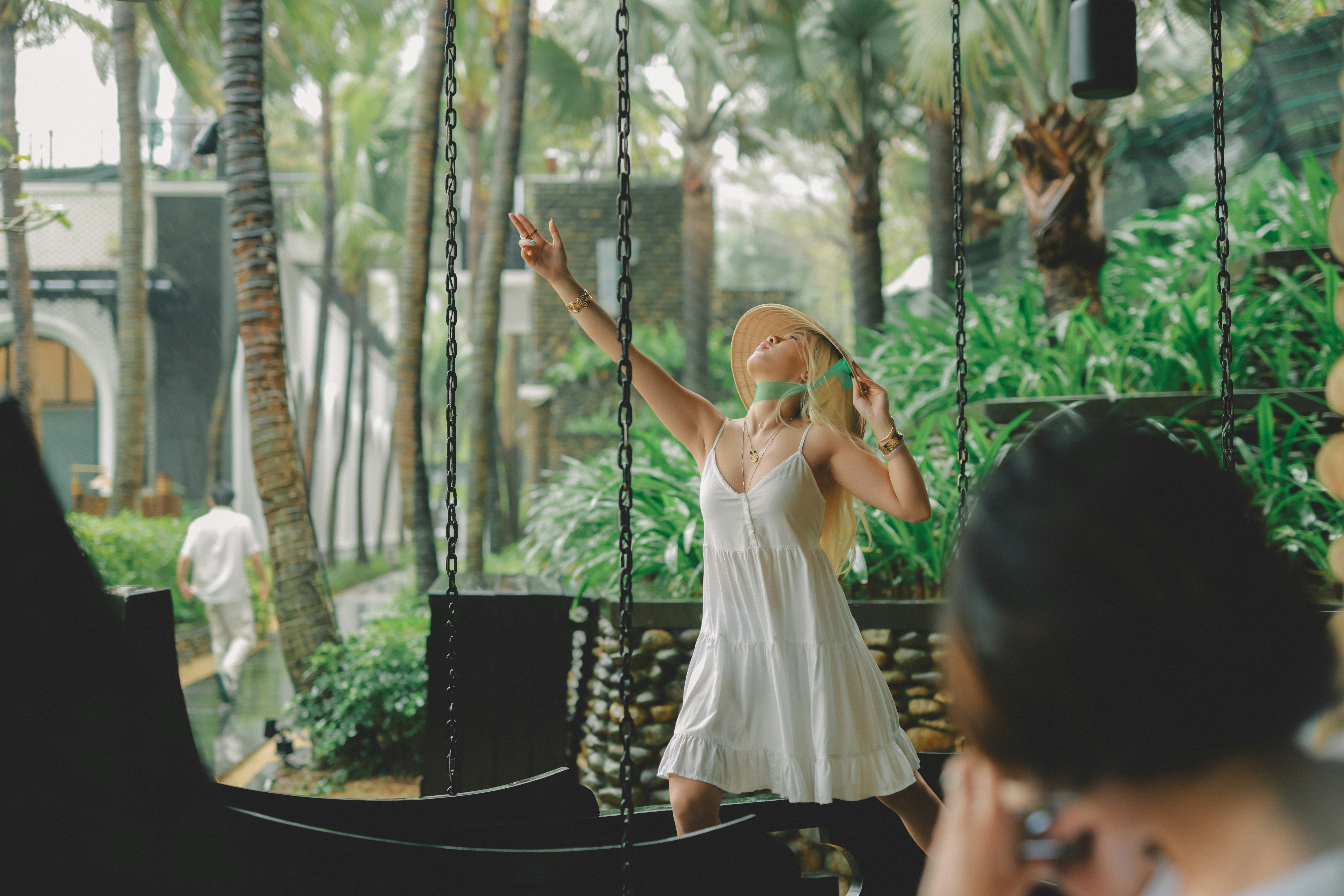 Candy-Colored Swing: A Sunlit Moment on the Resort Swing