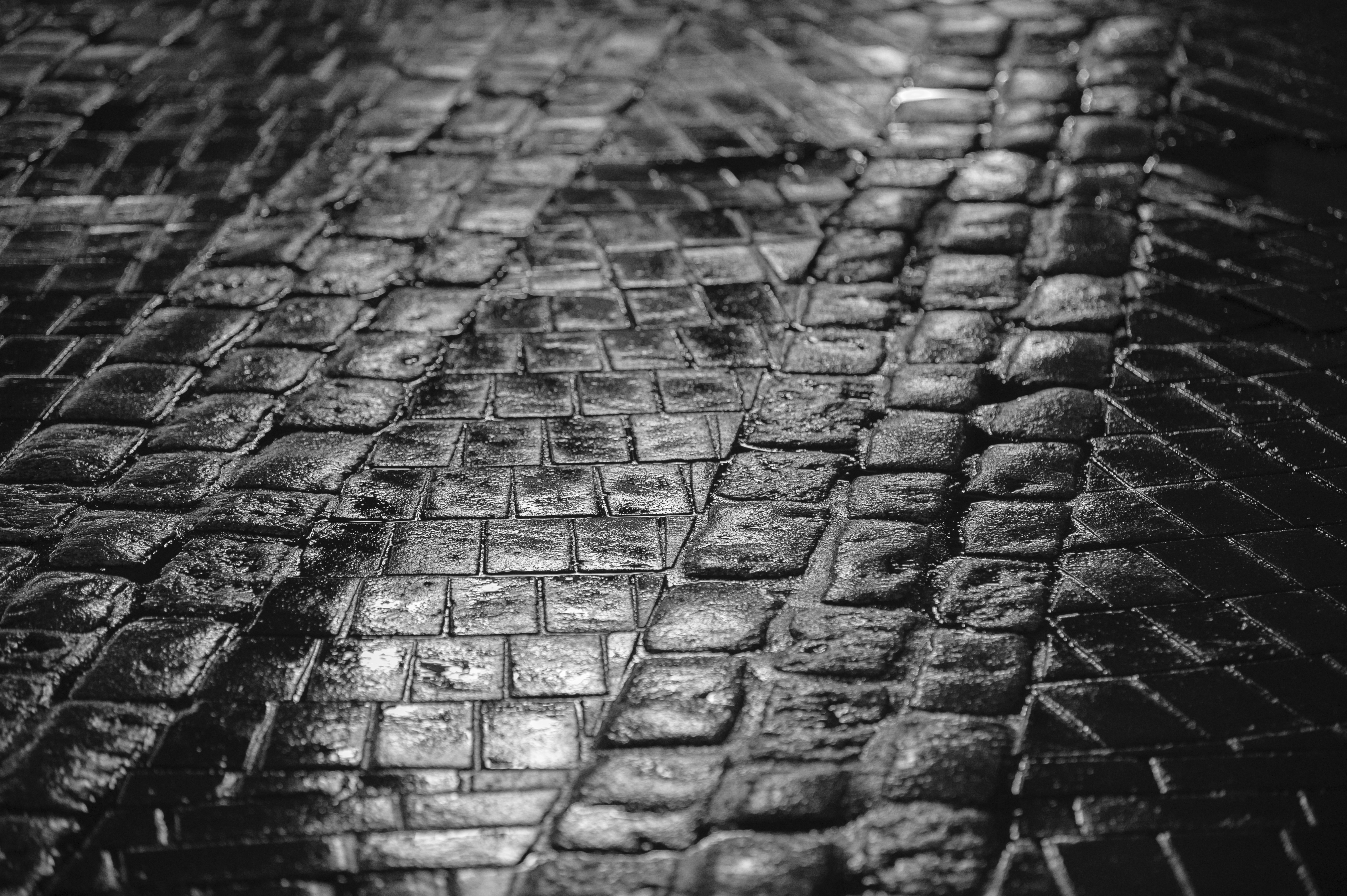 Cobblestone Reflection: A Quiet Walk at Dusk