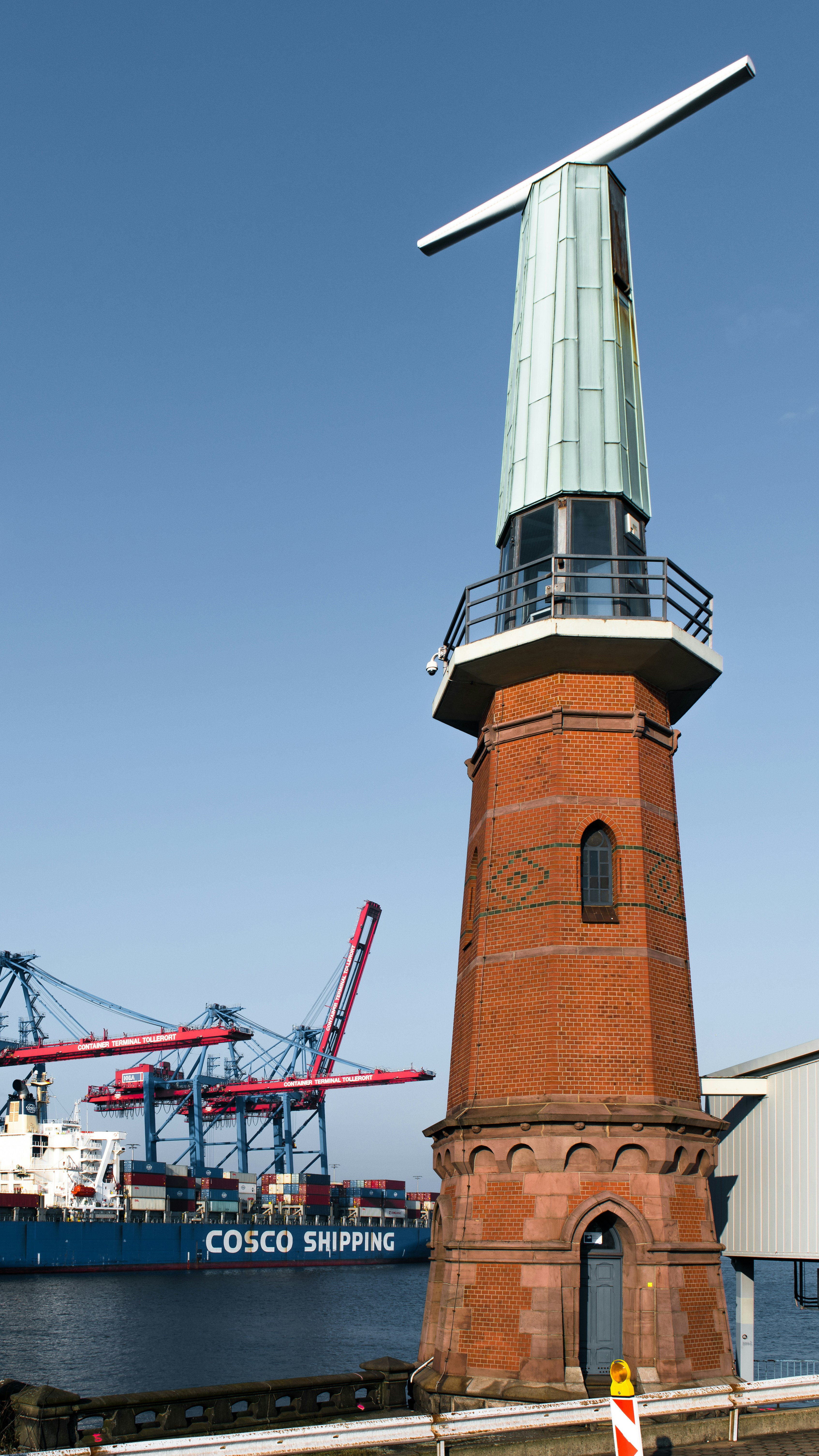 Lighthouse-Tower at Dockside Green: A Brick Beacon Above the Blue Horizon