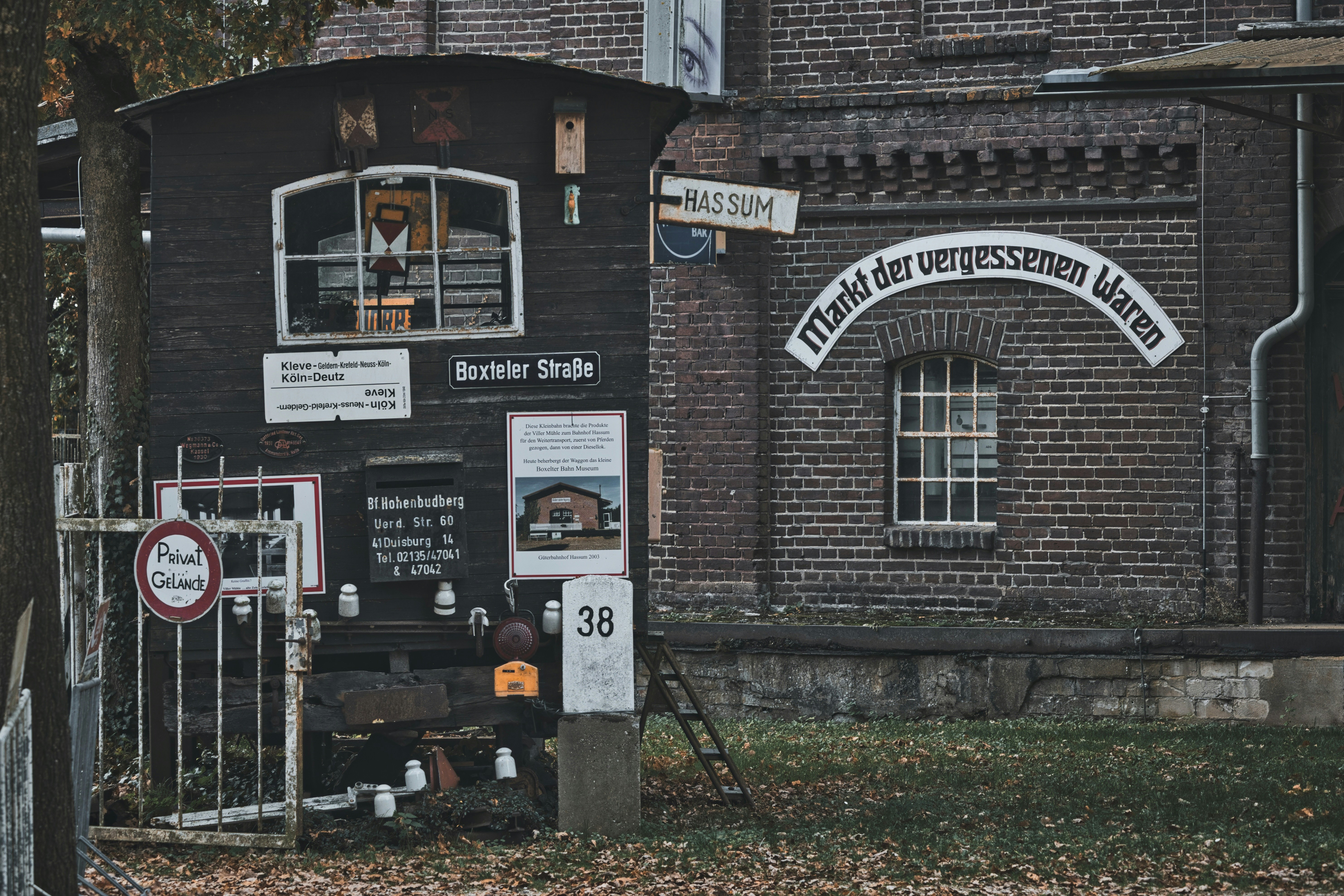 Brick-Worn Gatehouse and Signage at a Historic German Warehouse