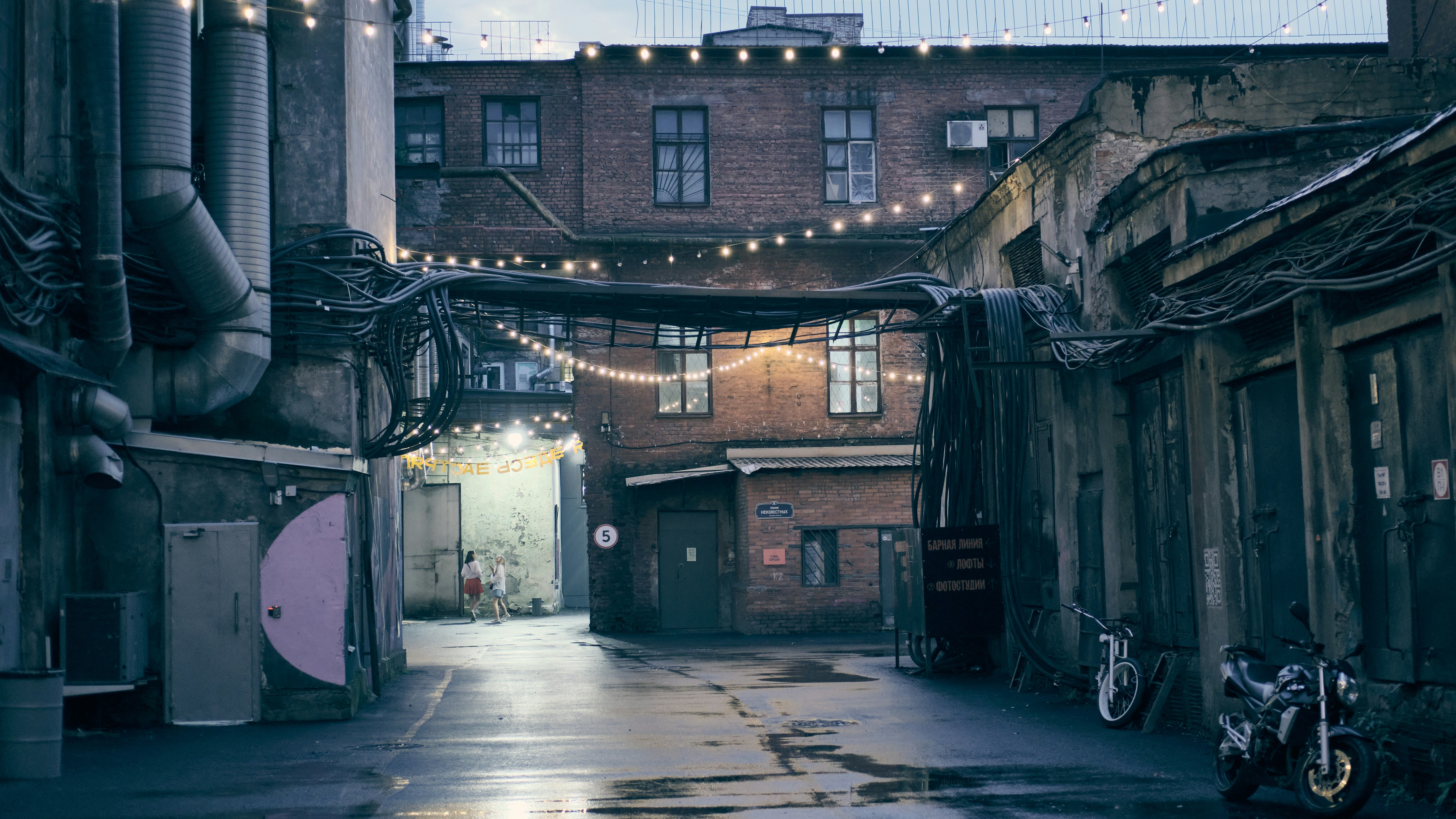 Neon-lit Courtyard Corridor