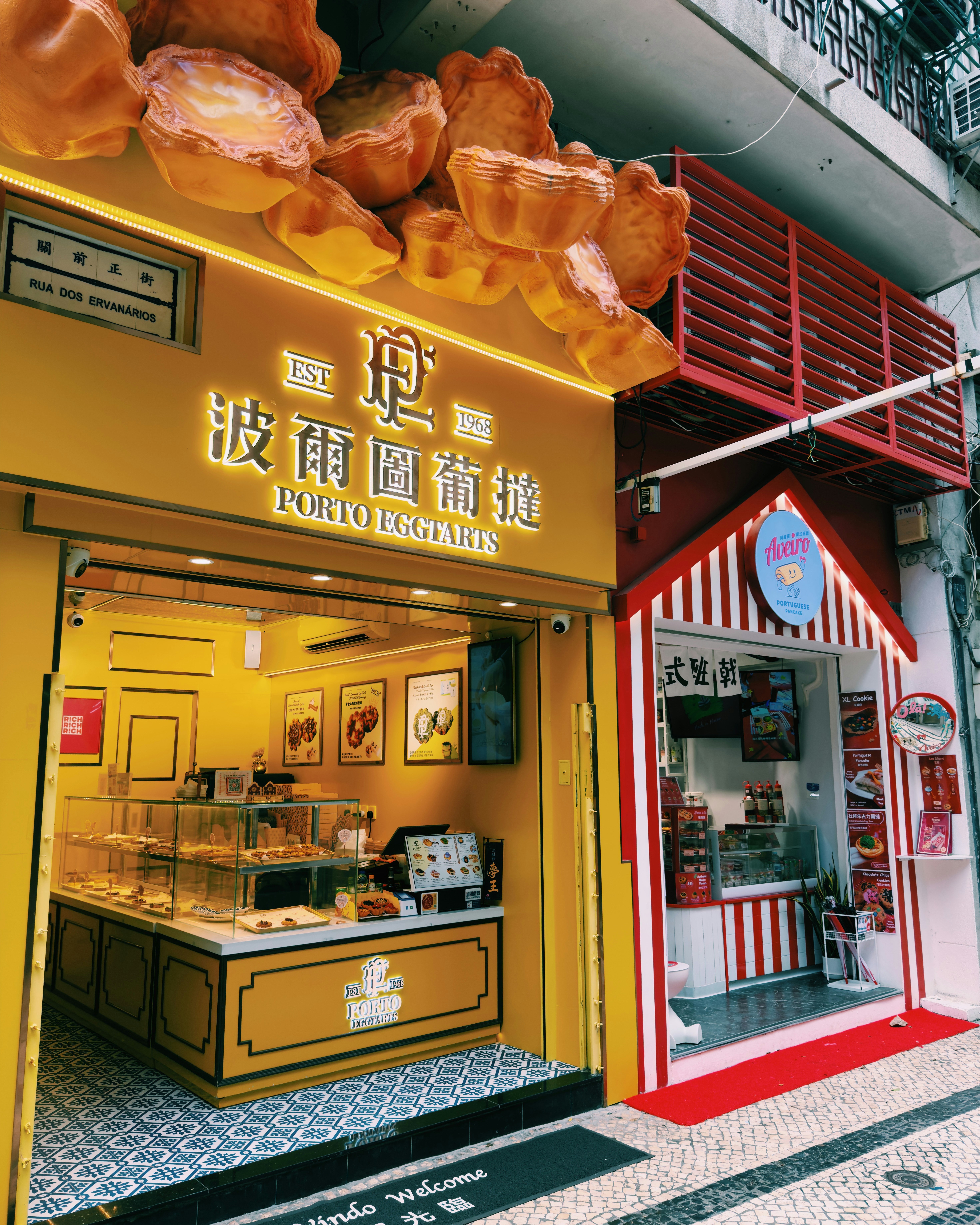Golden Signage and Street-Level Pastry Shine