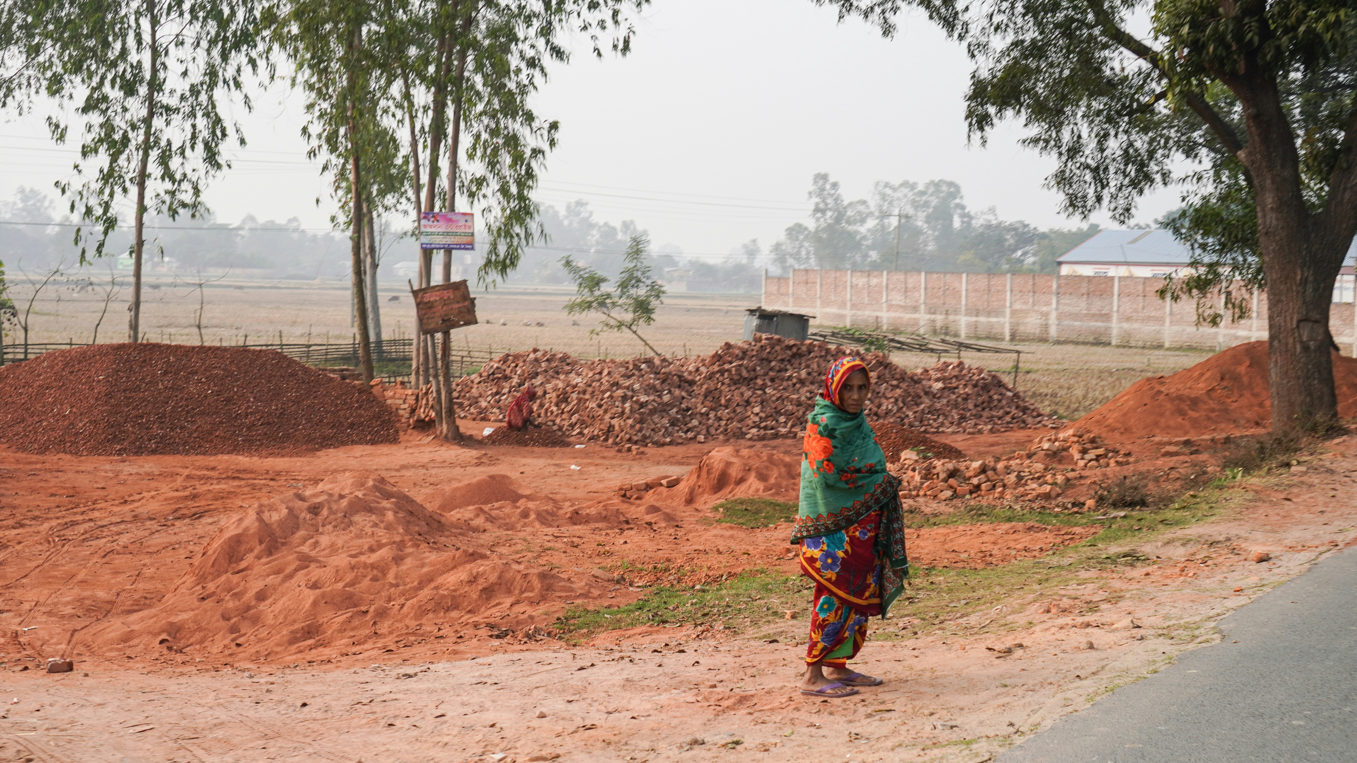 Dusty Roadside Portrait of a Child in Colorful Attire