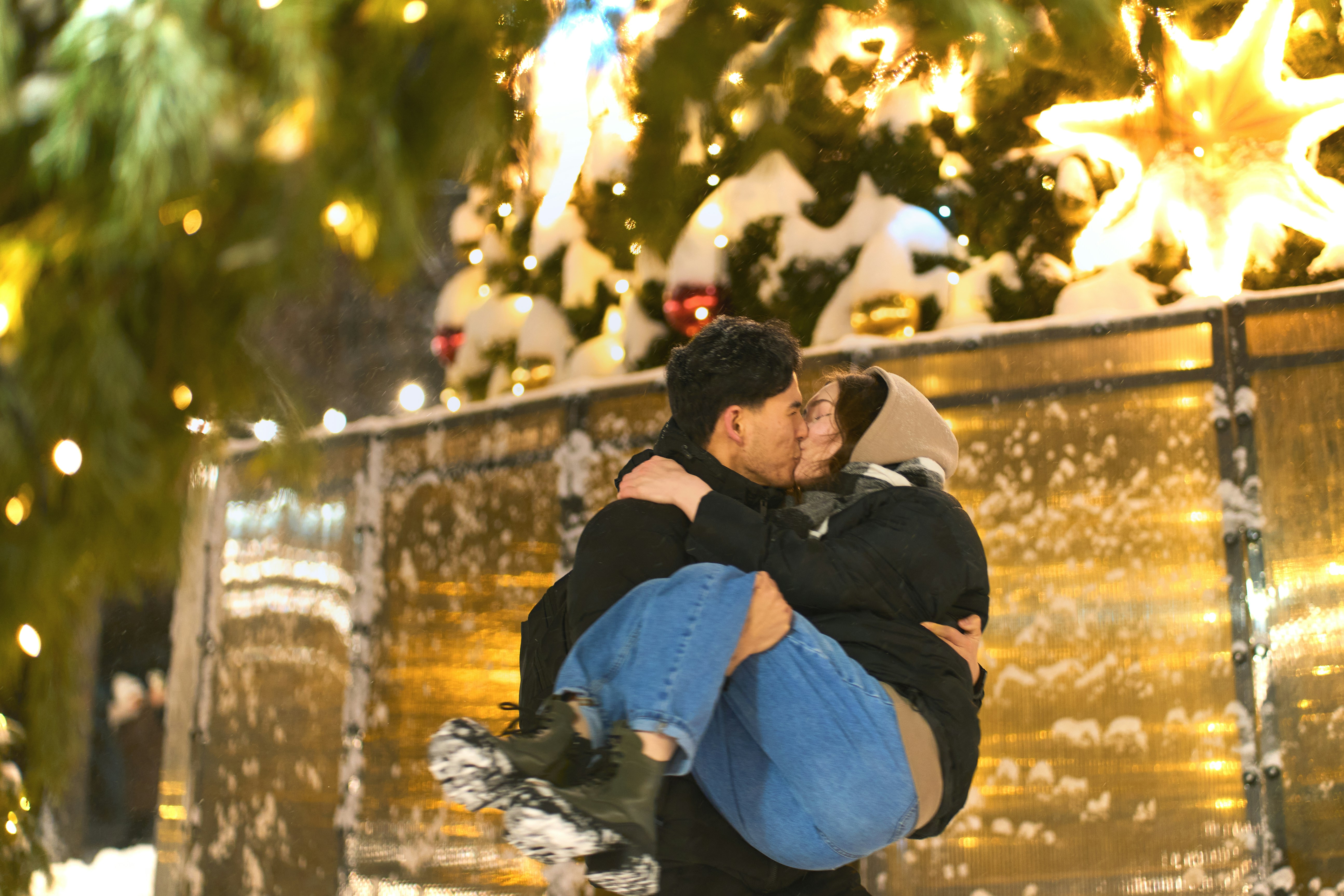 Warm Embrace Amid Festive Lights