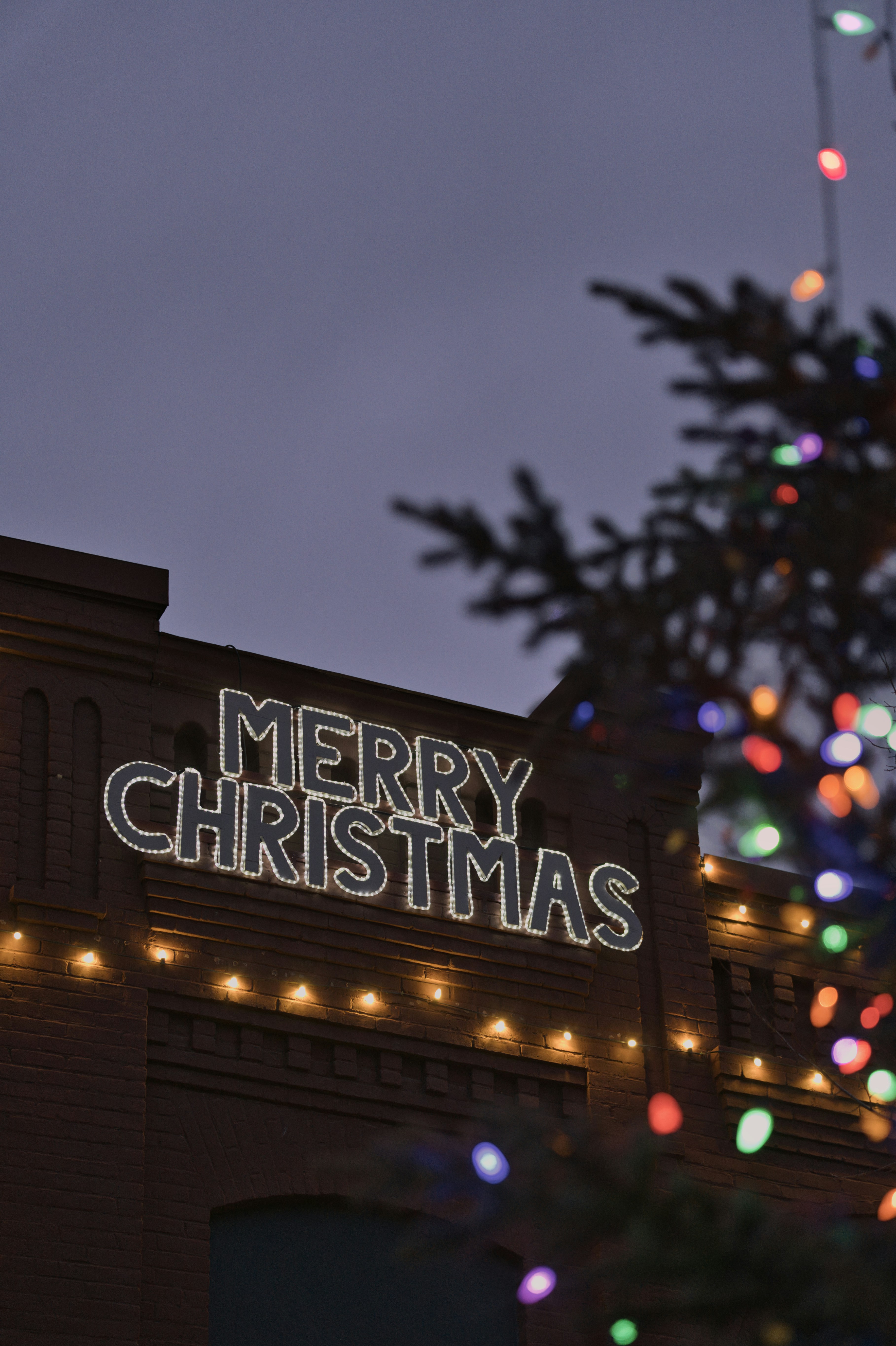 Merry Lights on a Brick Canvas