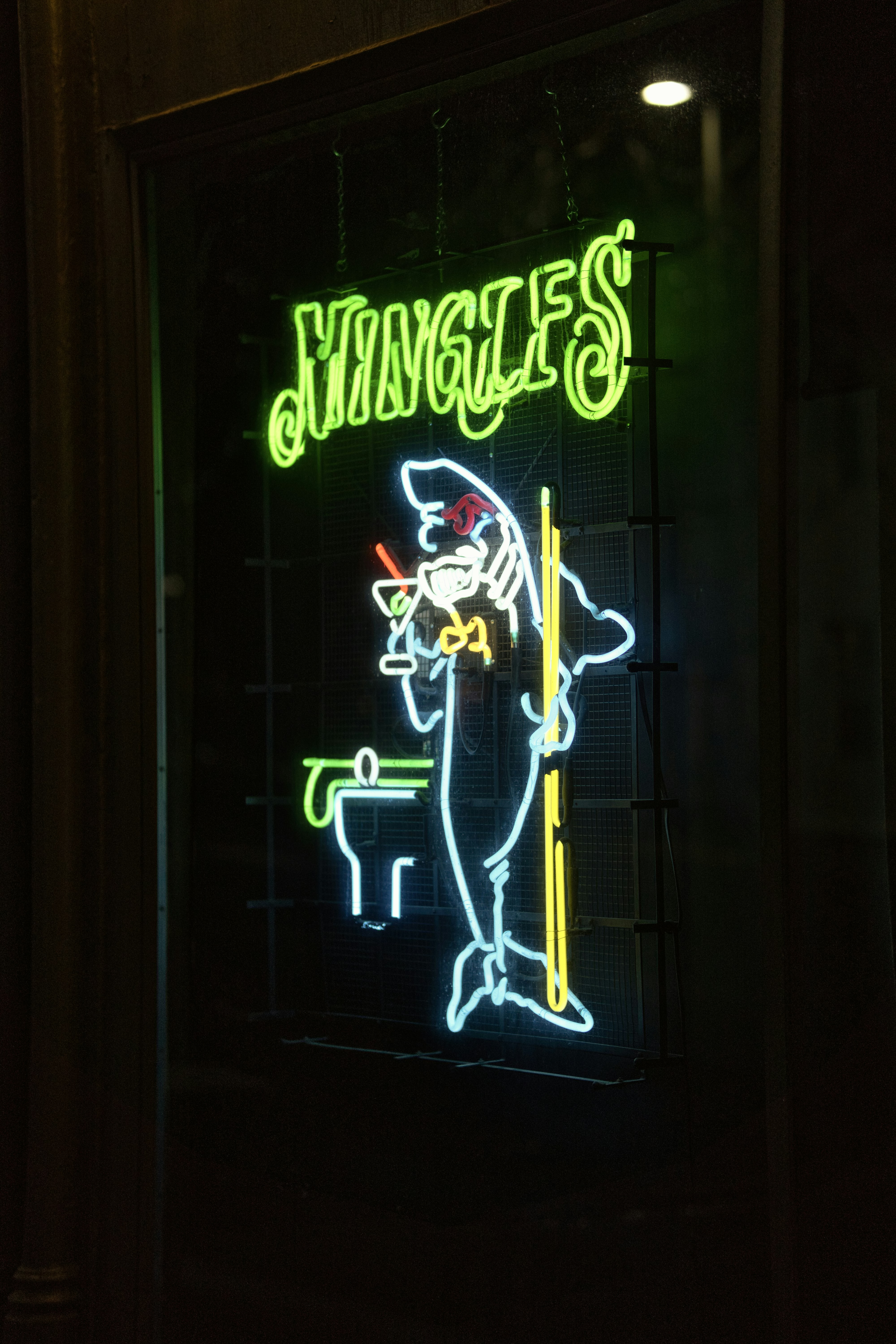 Neon Jingle: A Hazy Night at Jinggles Bar