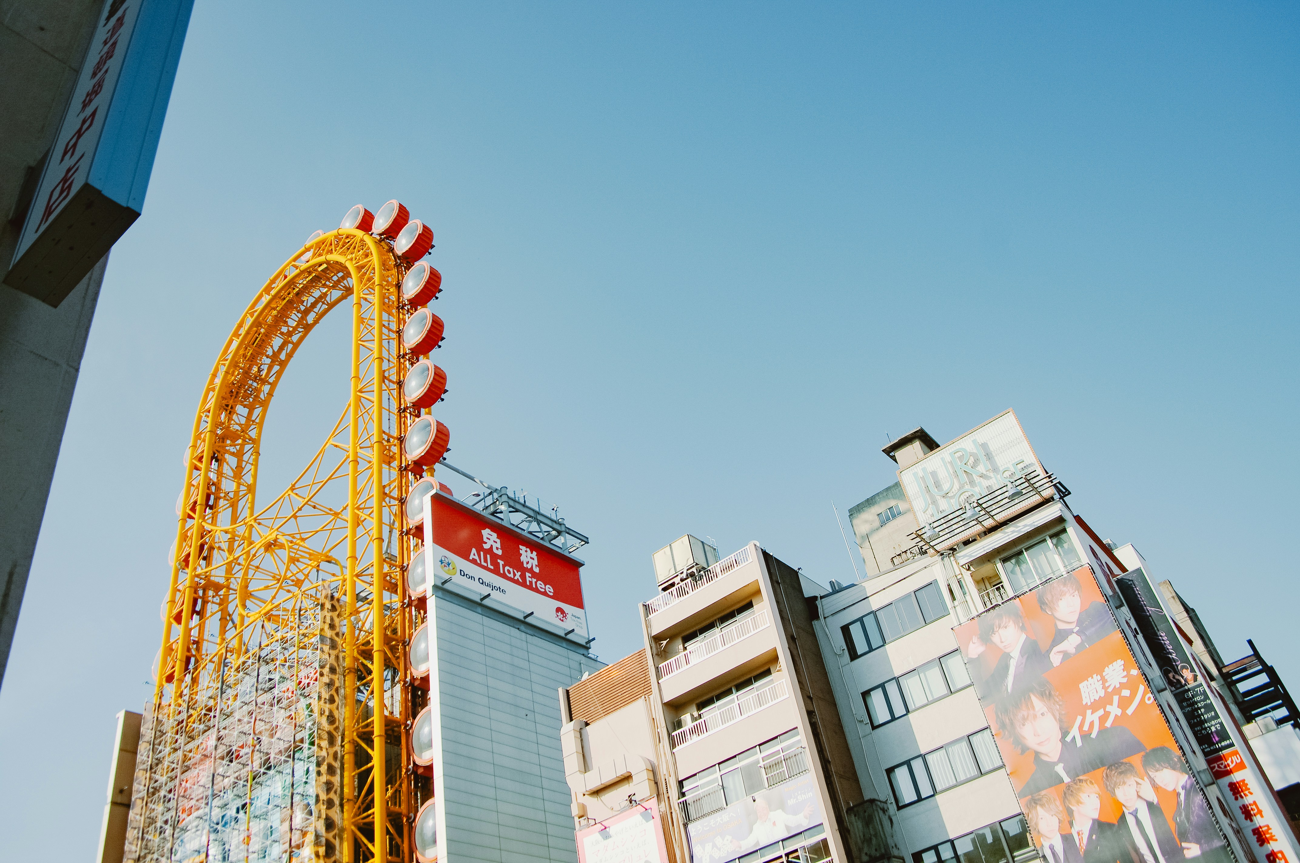 Neon Arch Over Tokyo: A Skyscraper Crowned by a Sunrise Arc