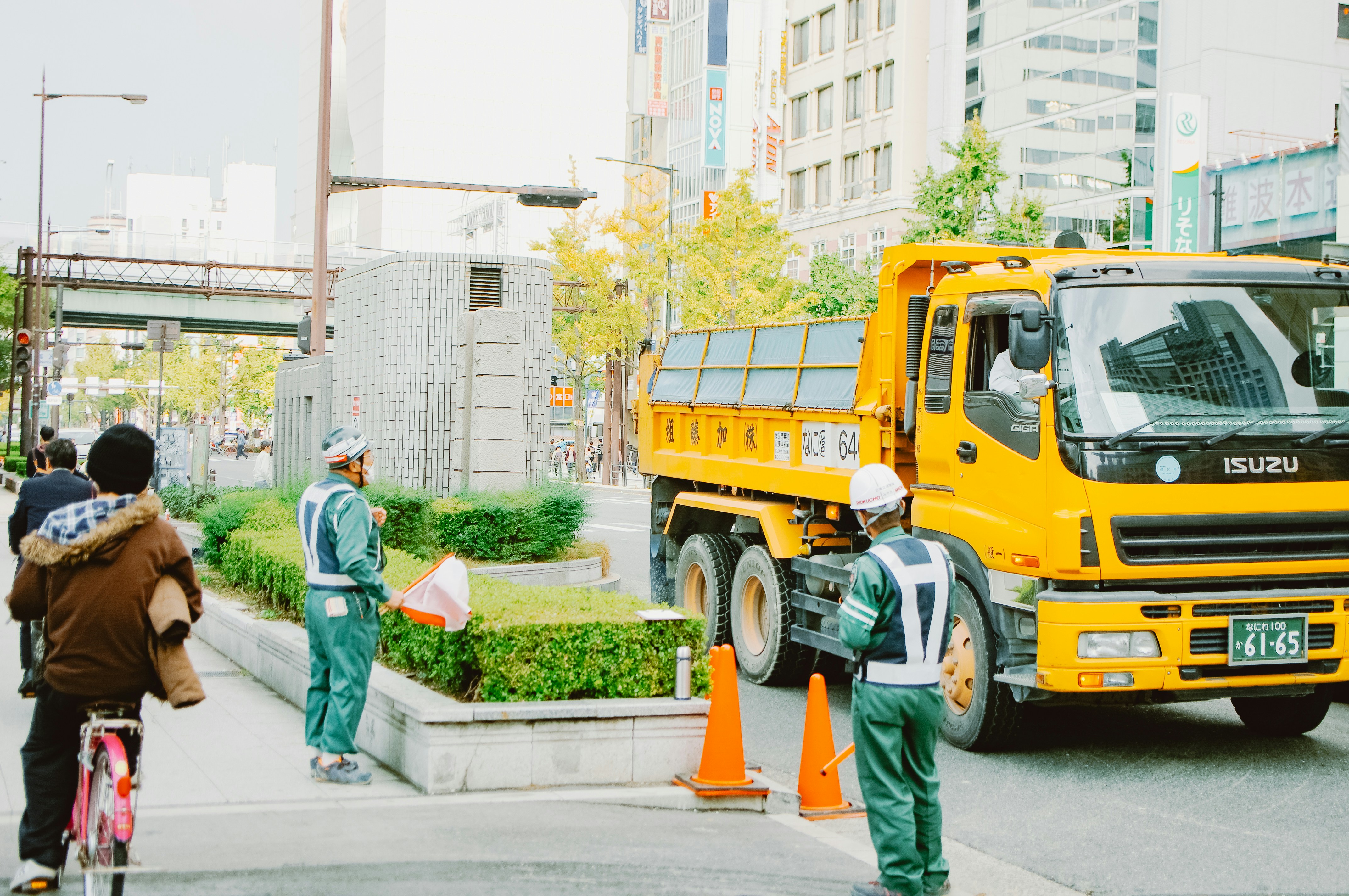 Yellow Dump Truck at a City Construction Corner
