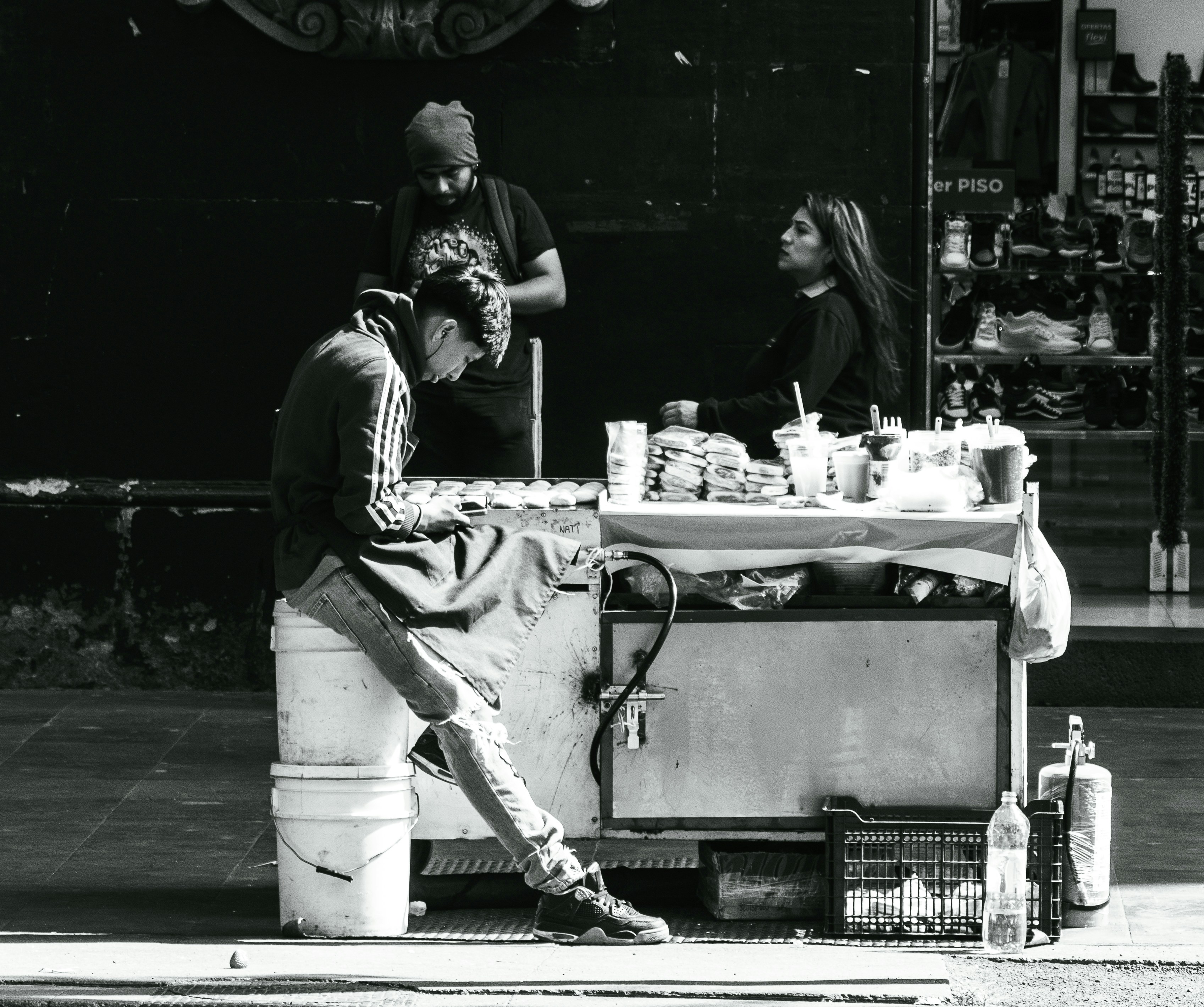 Street-side Portrait with a quiet focus on Craft and Customer