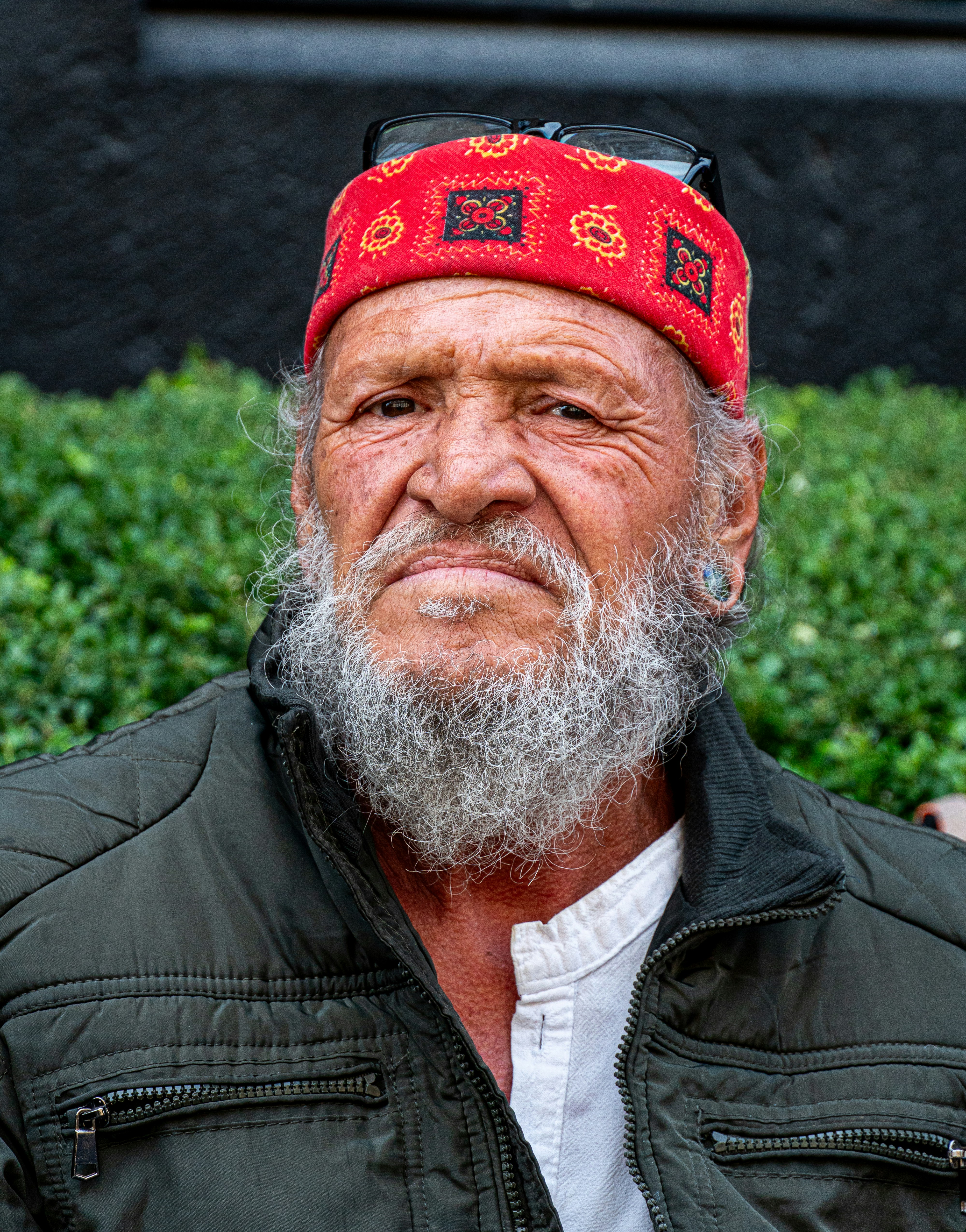 Wrinkled Wisdom: A Gaze Beneath the Red Bandana