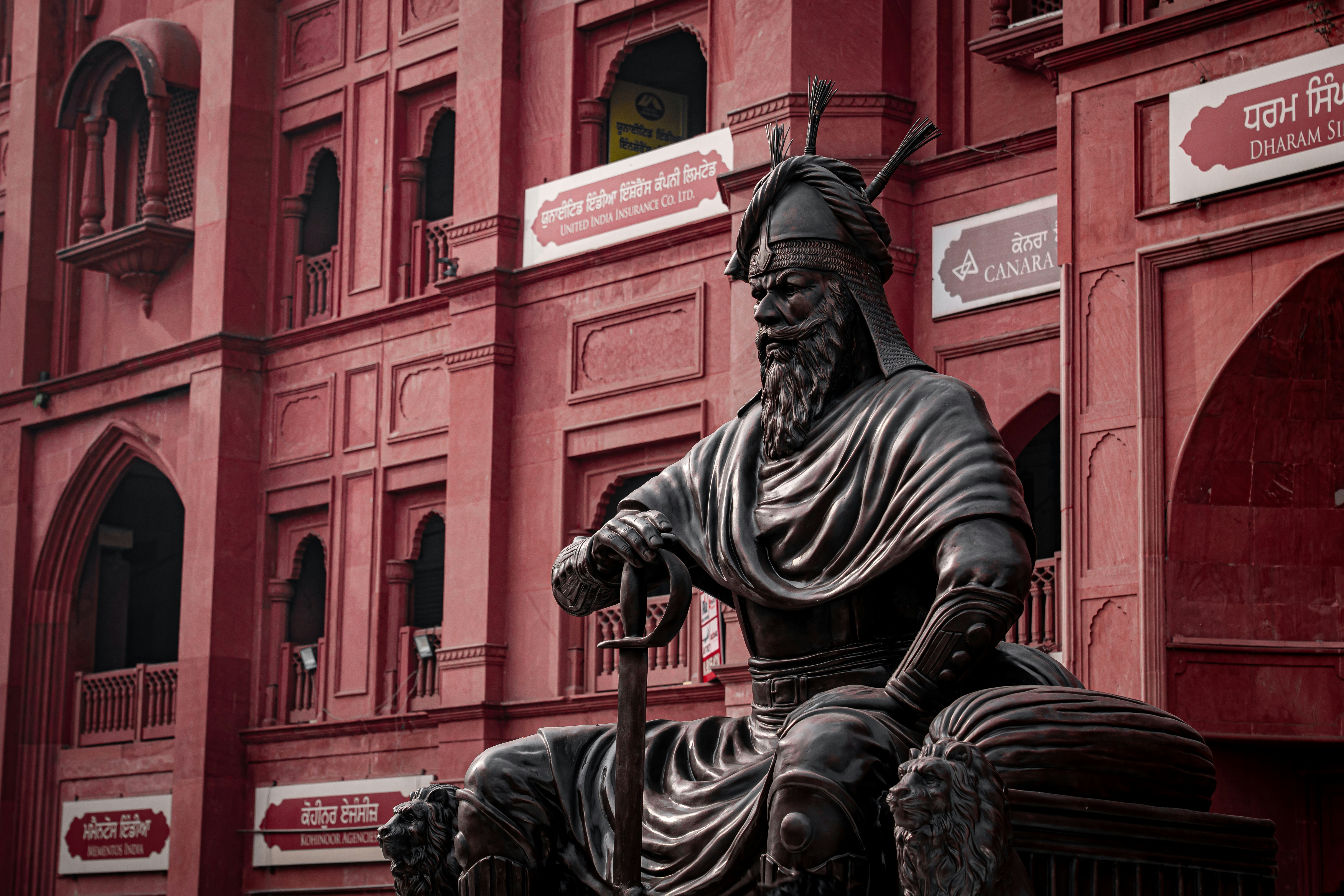 Sage General on a Pedestal: Guardians of the Red Facade