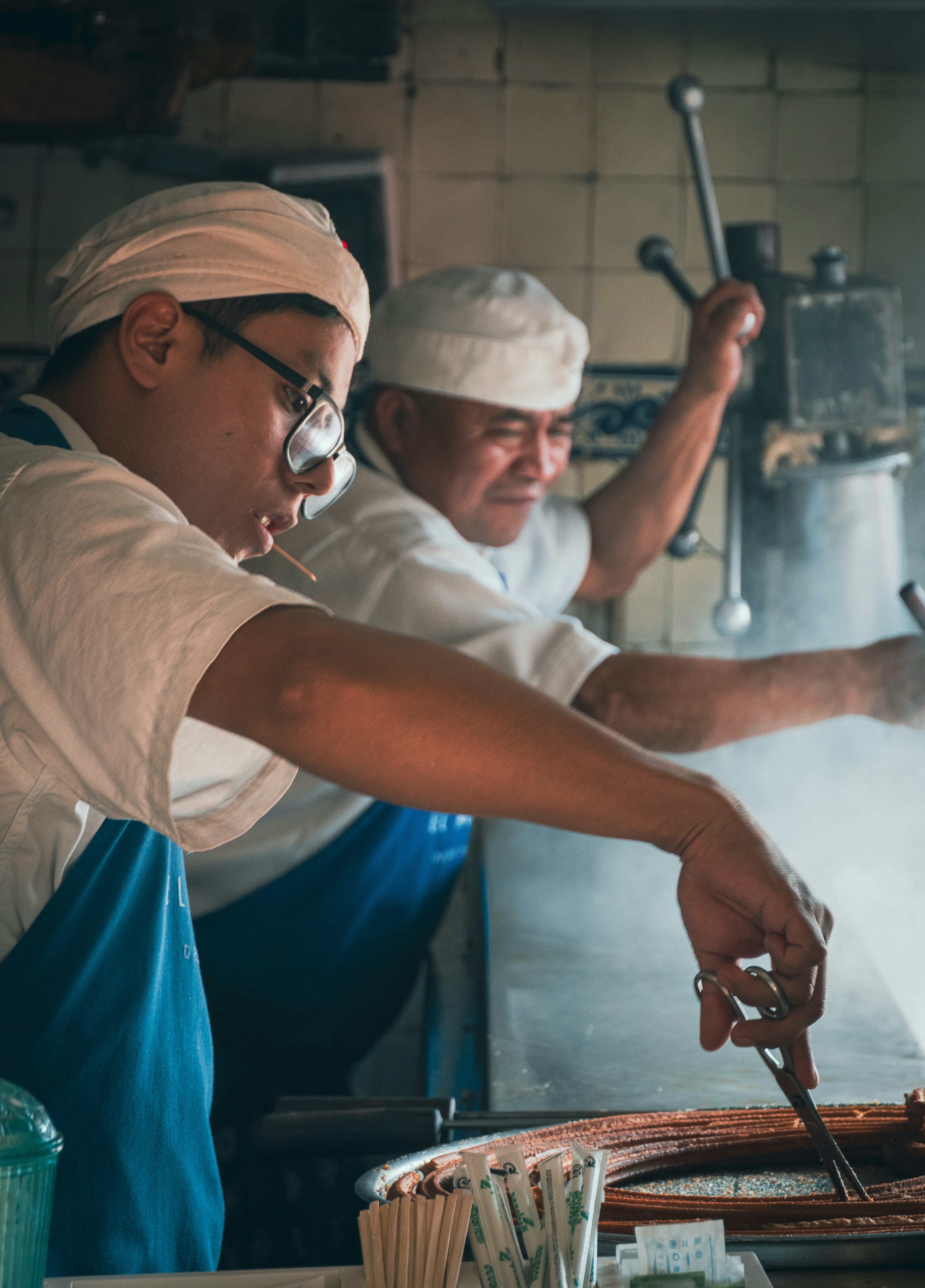 Steam and precision: a chef at work turning copper coils