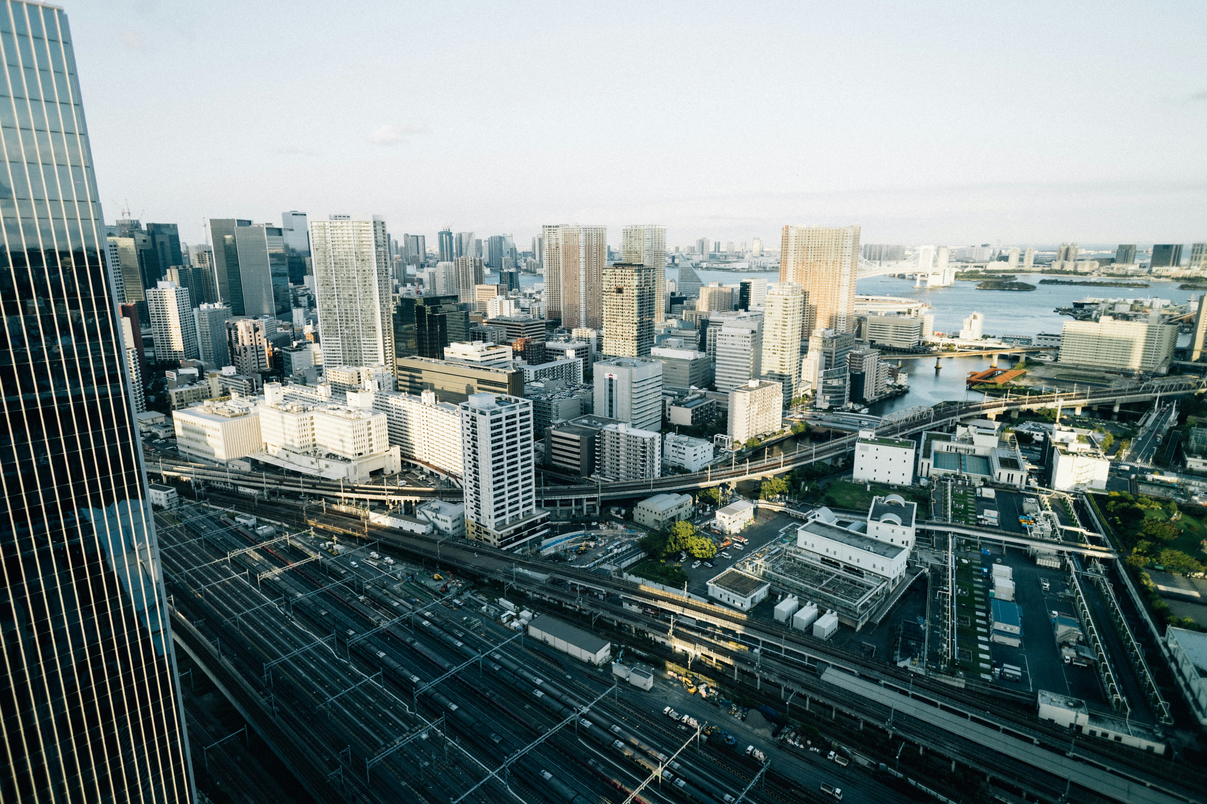 Modern cityscape with skyscrapers and train tracks photo – Free City ...