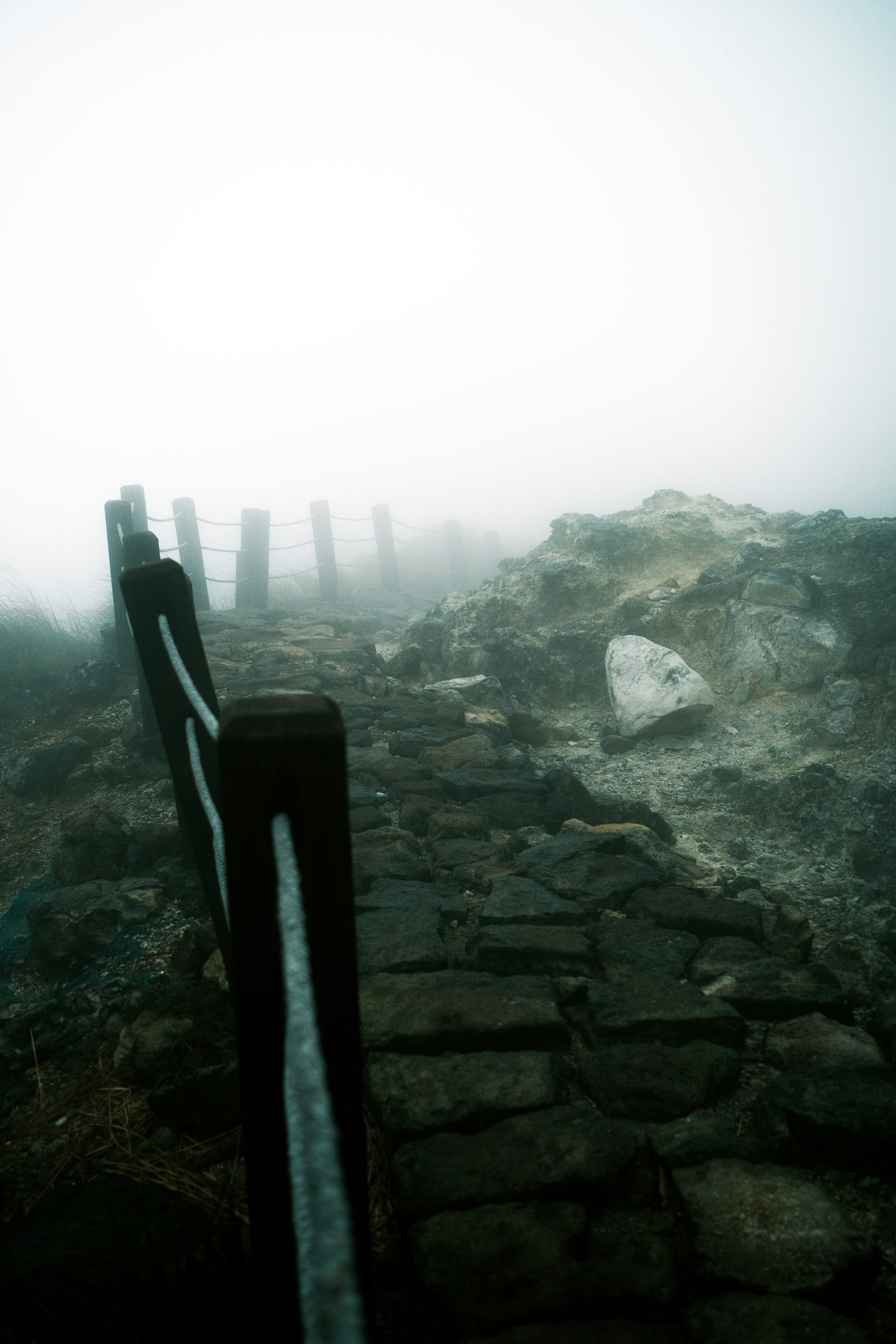 Mist-Clad Stone Path to the Unknown Cliff