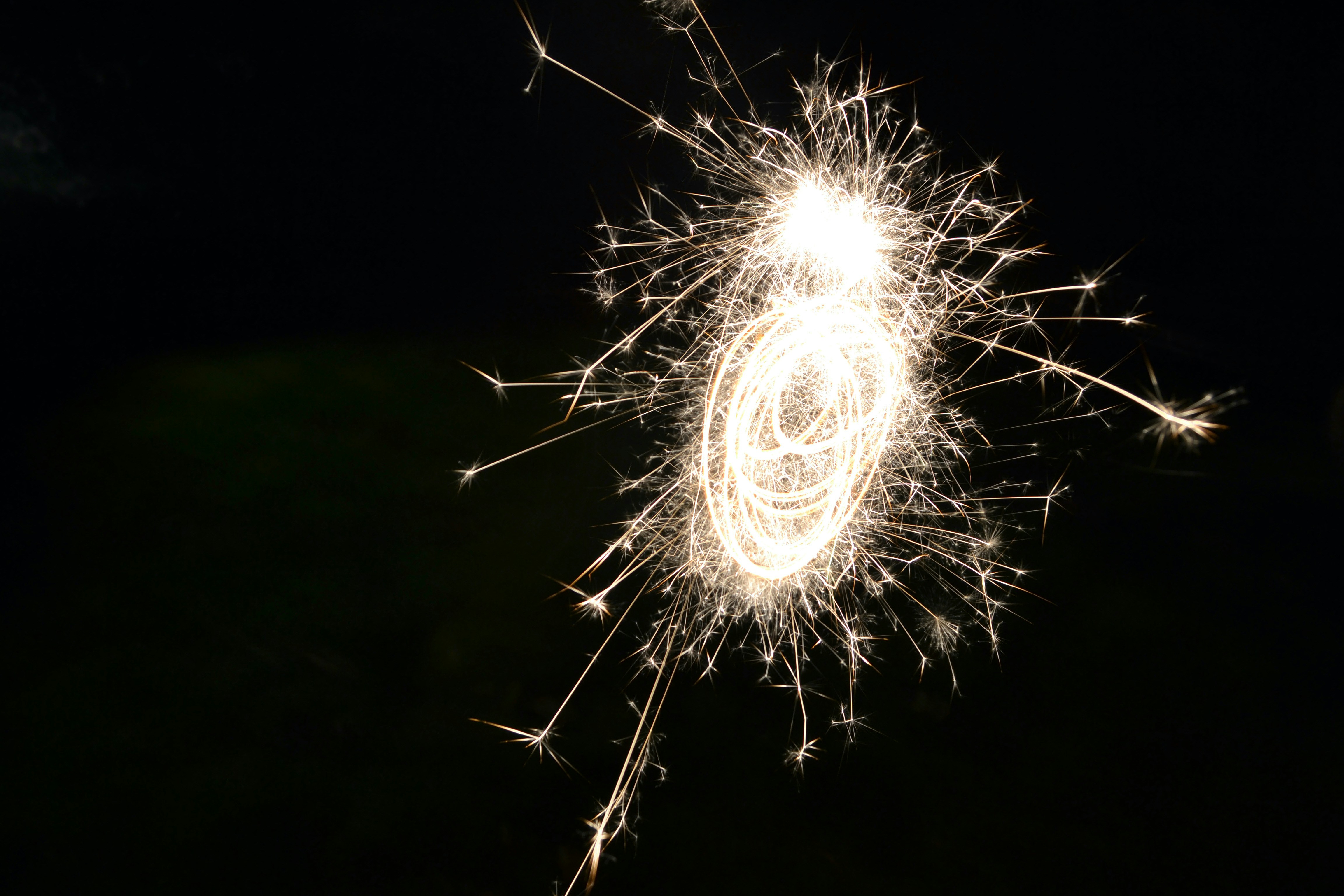 Sparkling Spiral: A Nighttime Moment of Firework-like Light