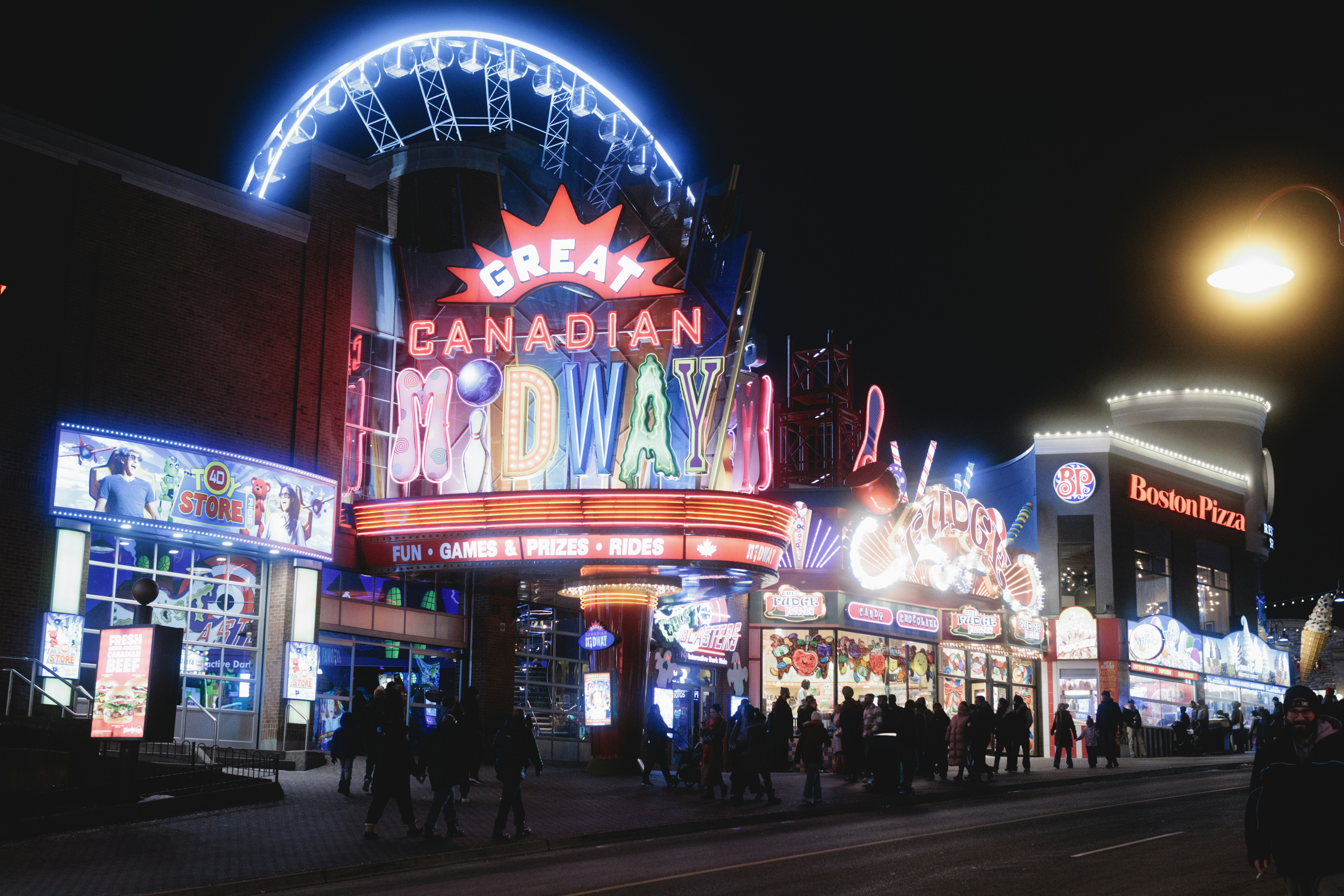 Neon Crest: Great Canadian Midway Under Night Sky