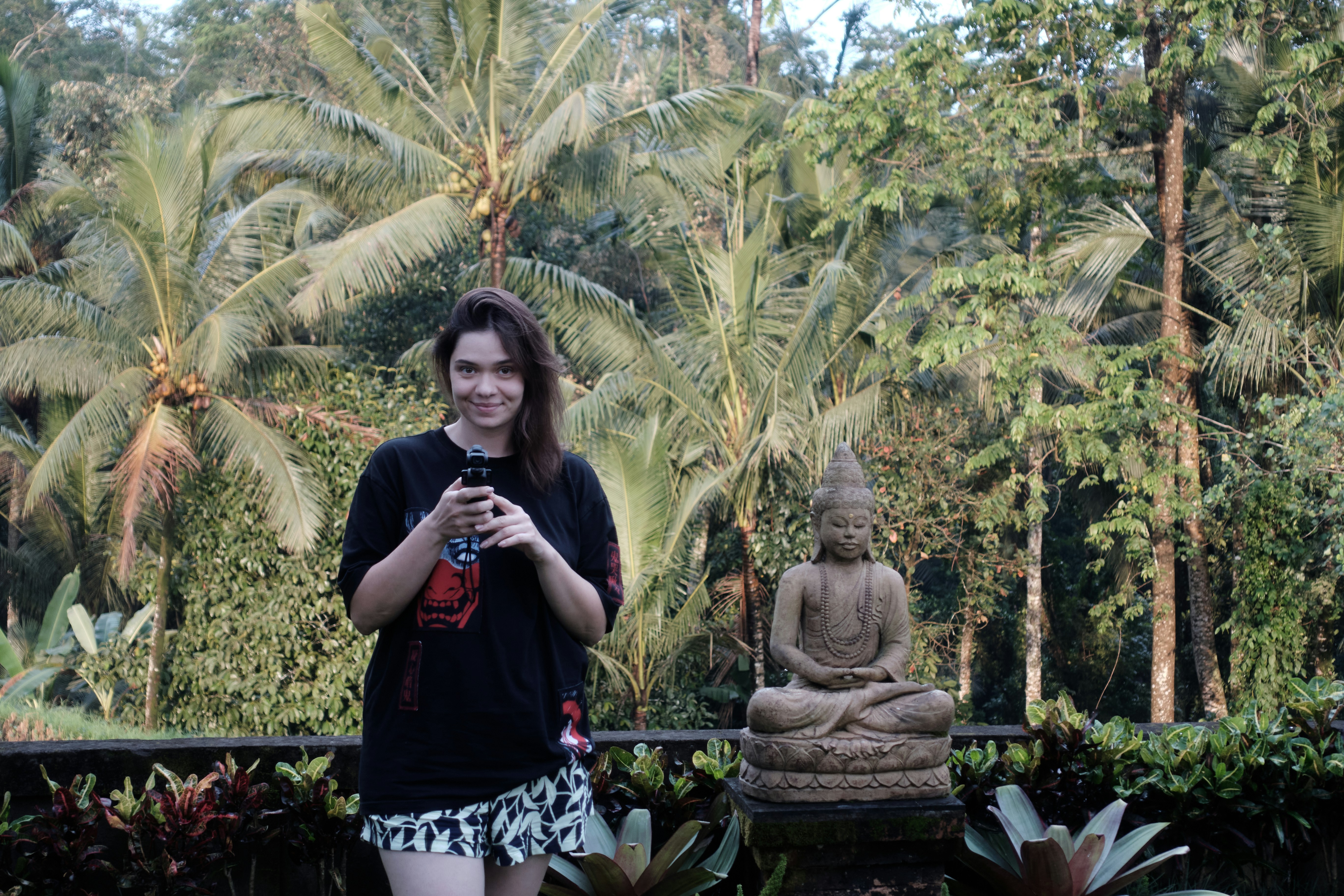 Serene Shrine Portrait: A Quiet Moment with a Gardener’s Companion