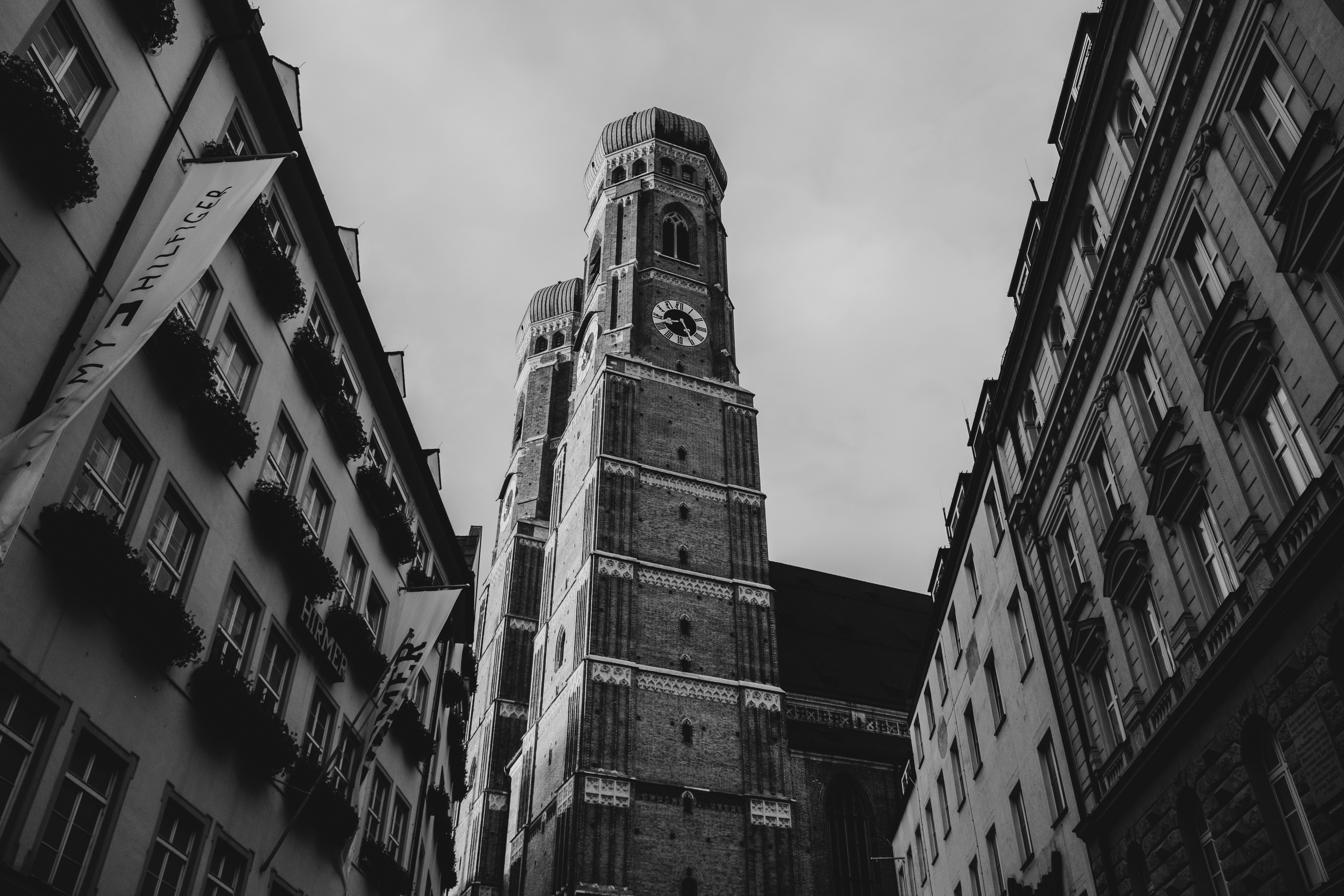 Clocktower Streak: A Narrow Street Moves Toward the City’s Sky