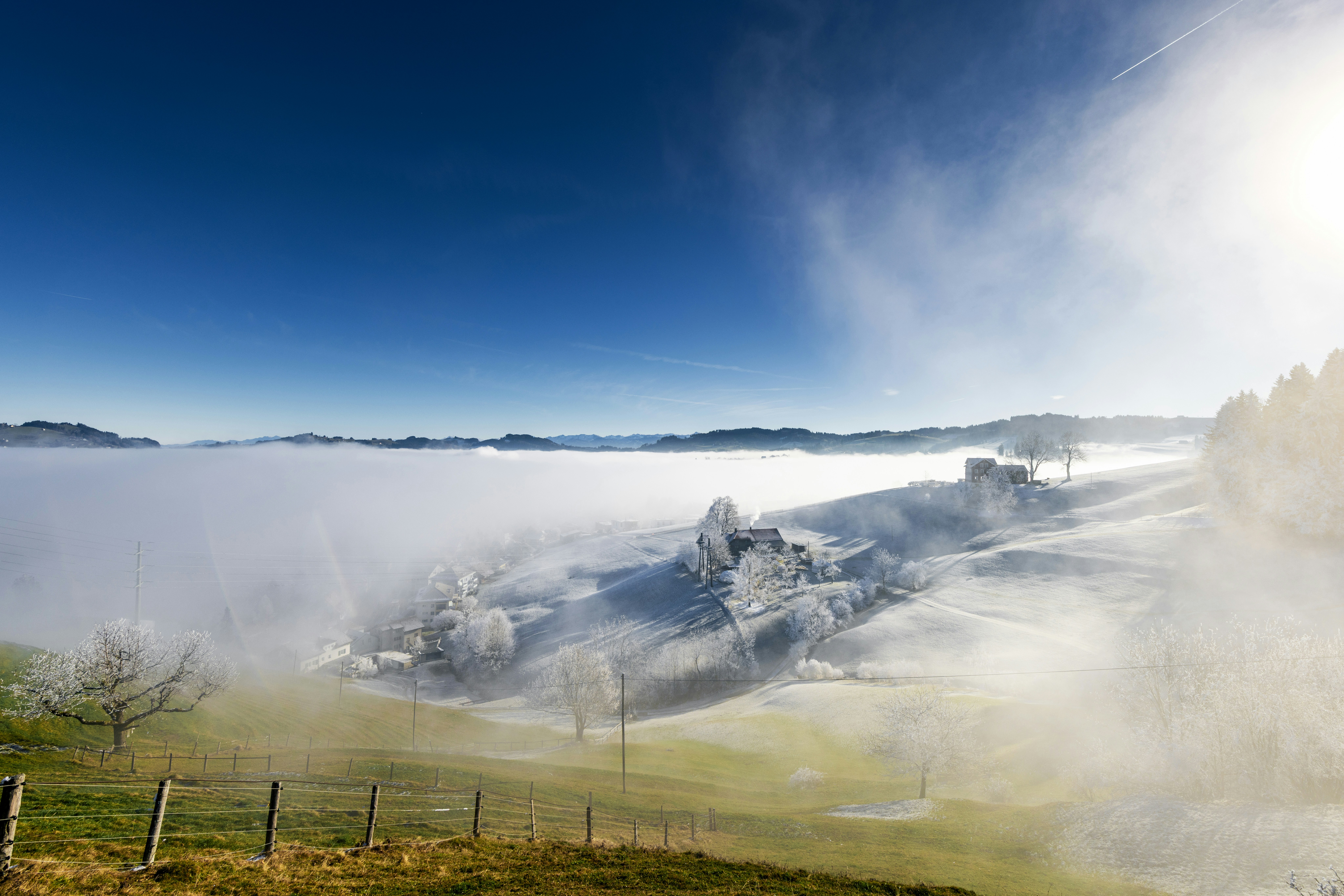 Mist-Lapped Ridge Over Quiet Valley