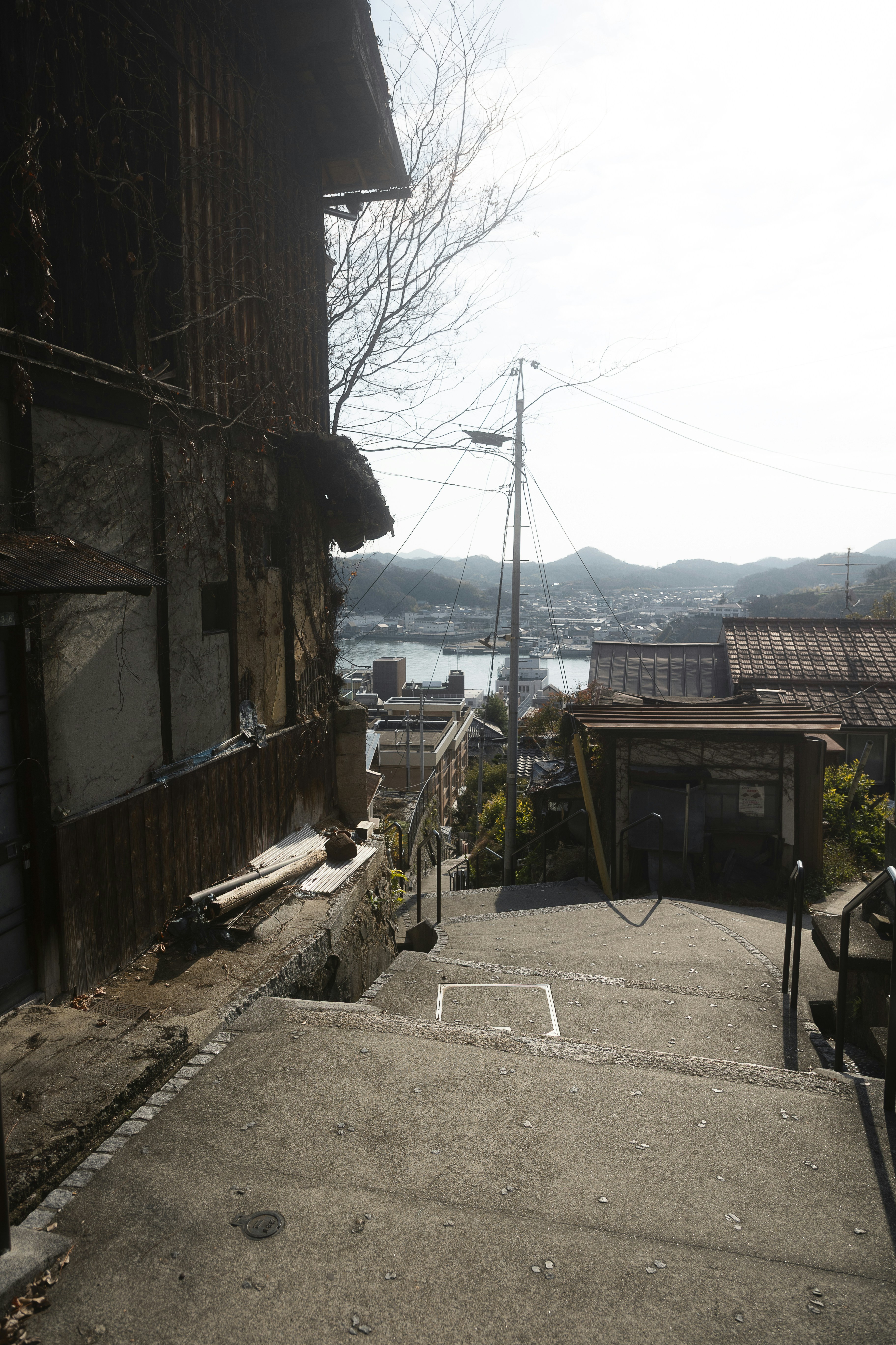 Steep Steps Toward the Harbor: A Quiet Climb Through an Aged Village