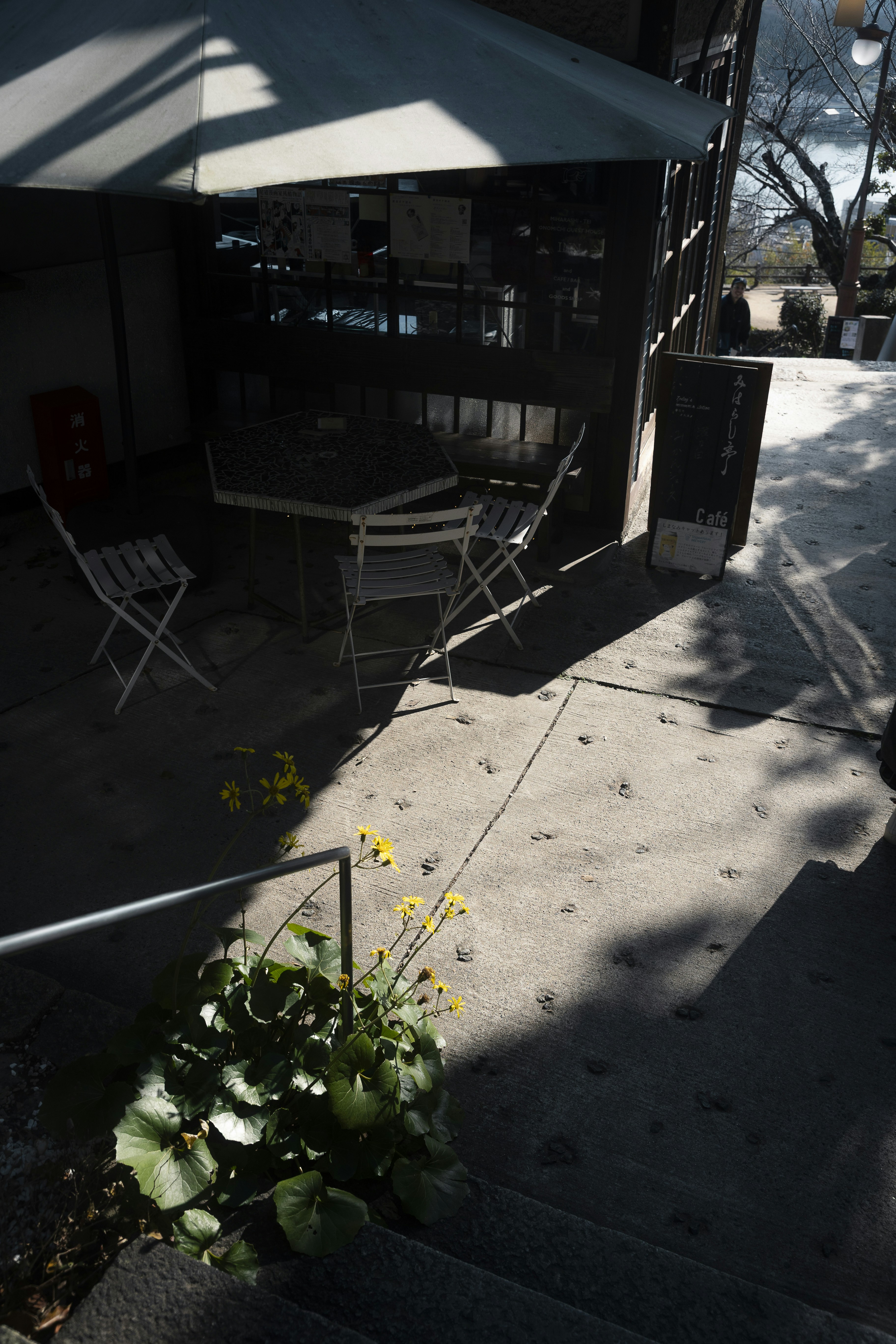 Shadowed Café Terrace in Afternoon Light