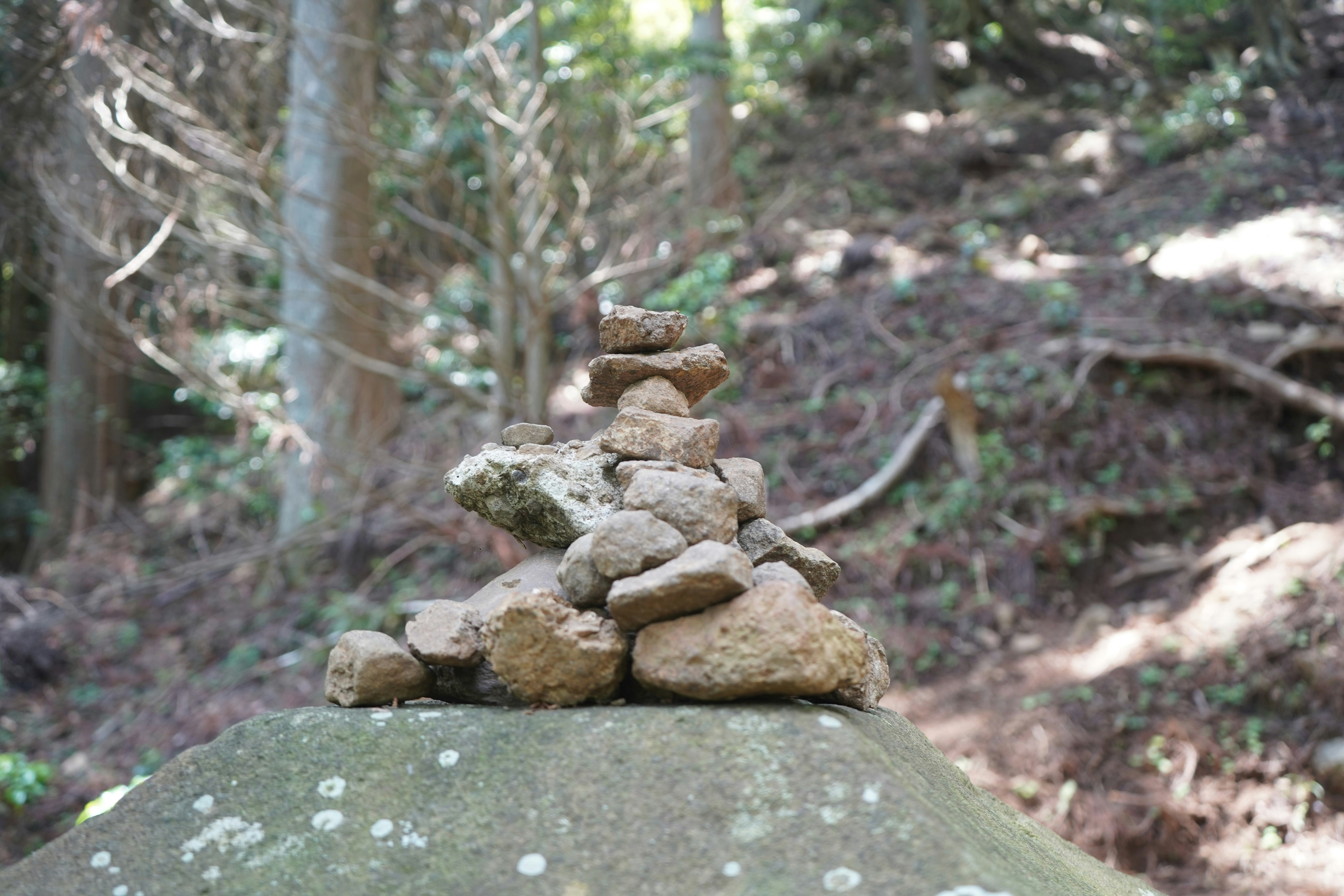 Stone Cairn on a Weathered Rock