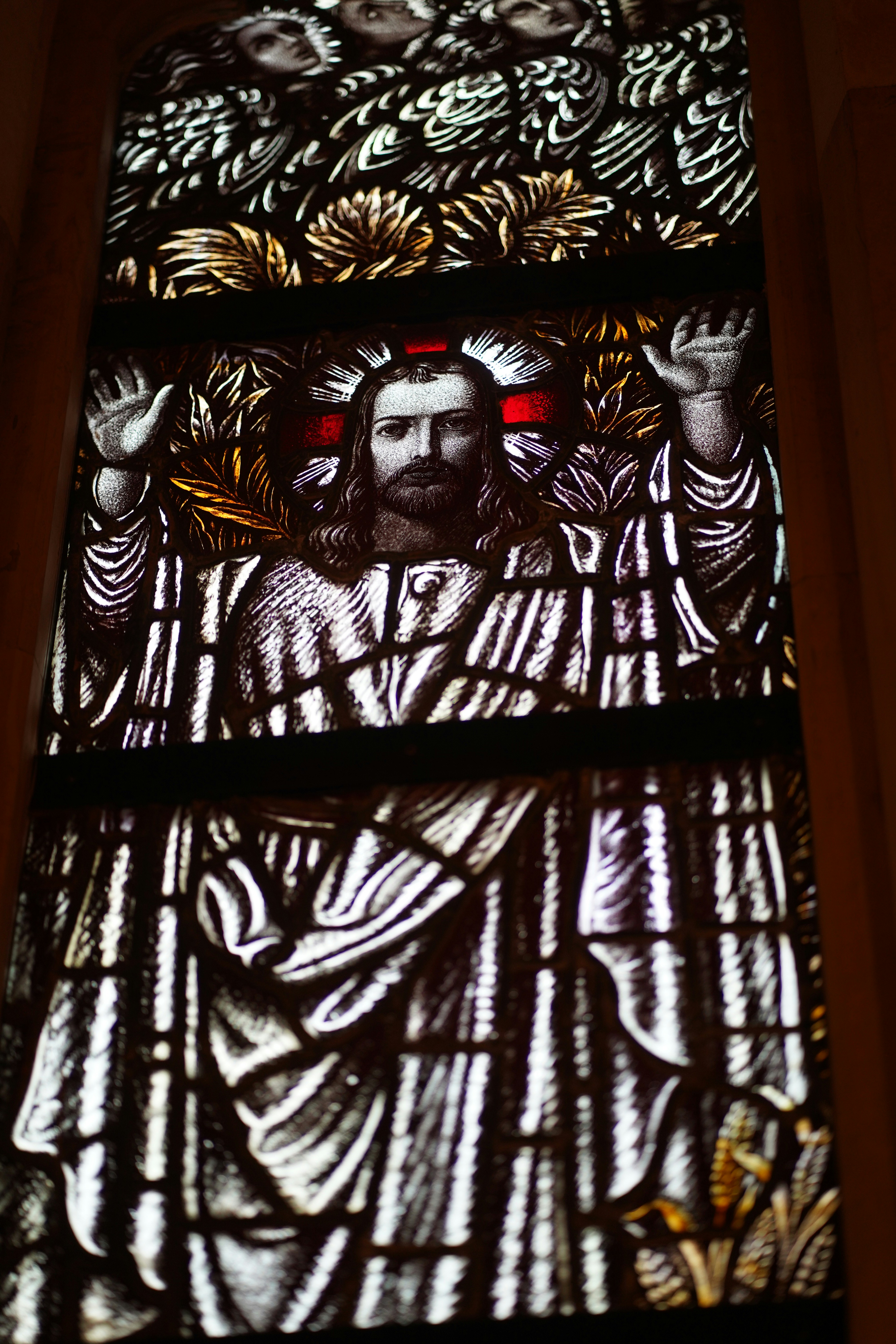 Haloed Window: A Saintly Figure in Stained Glass