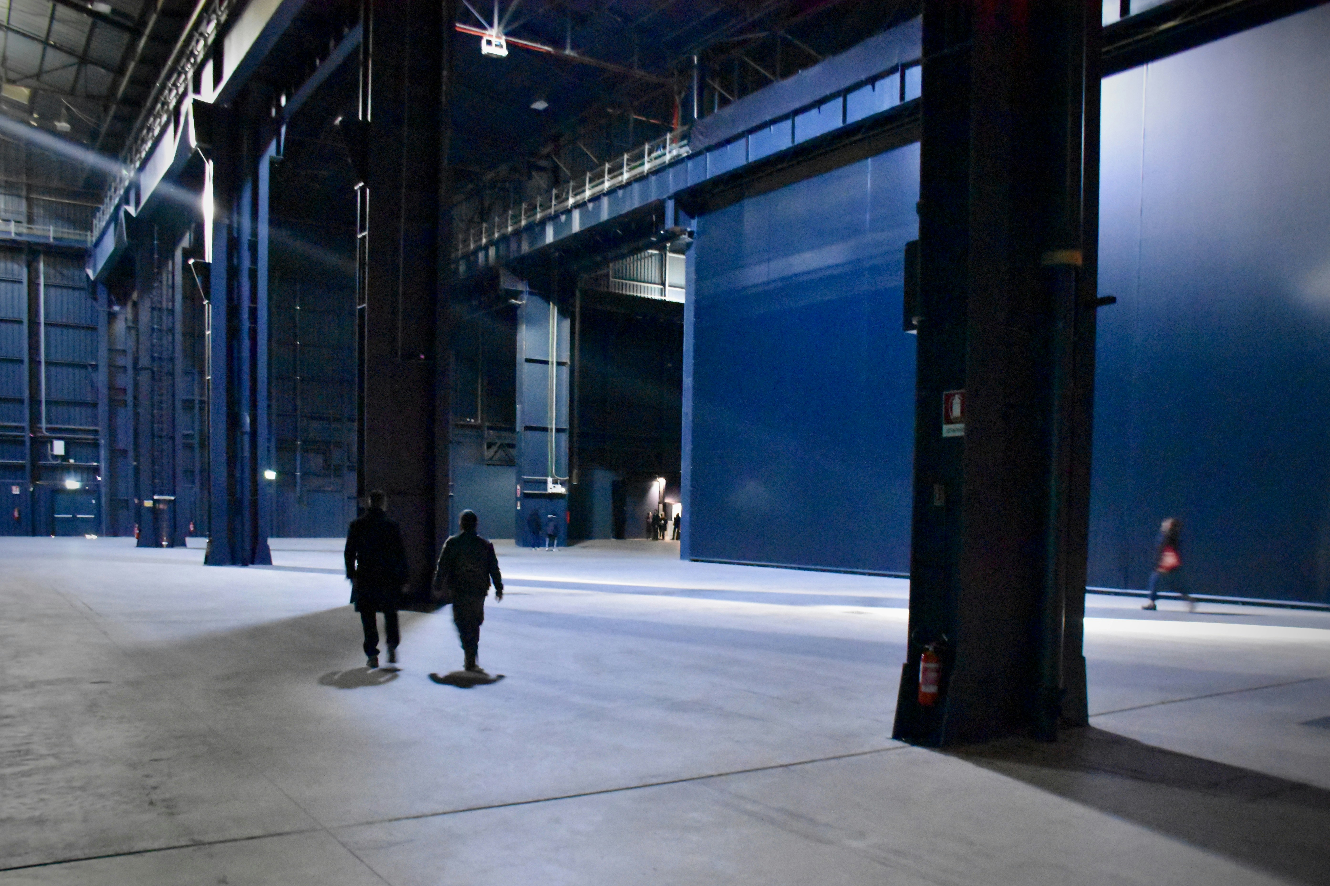 Shadowed Walkways in a Spacious Industrial Hall