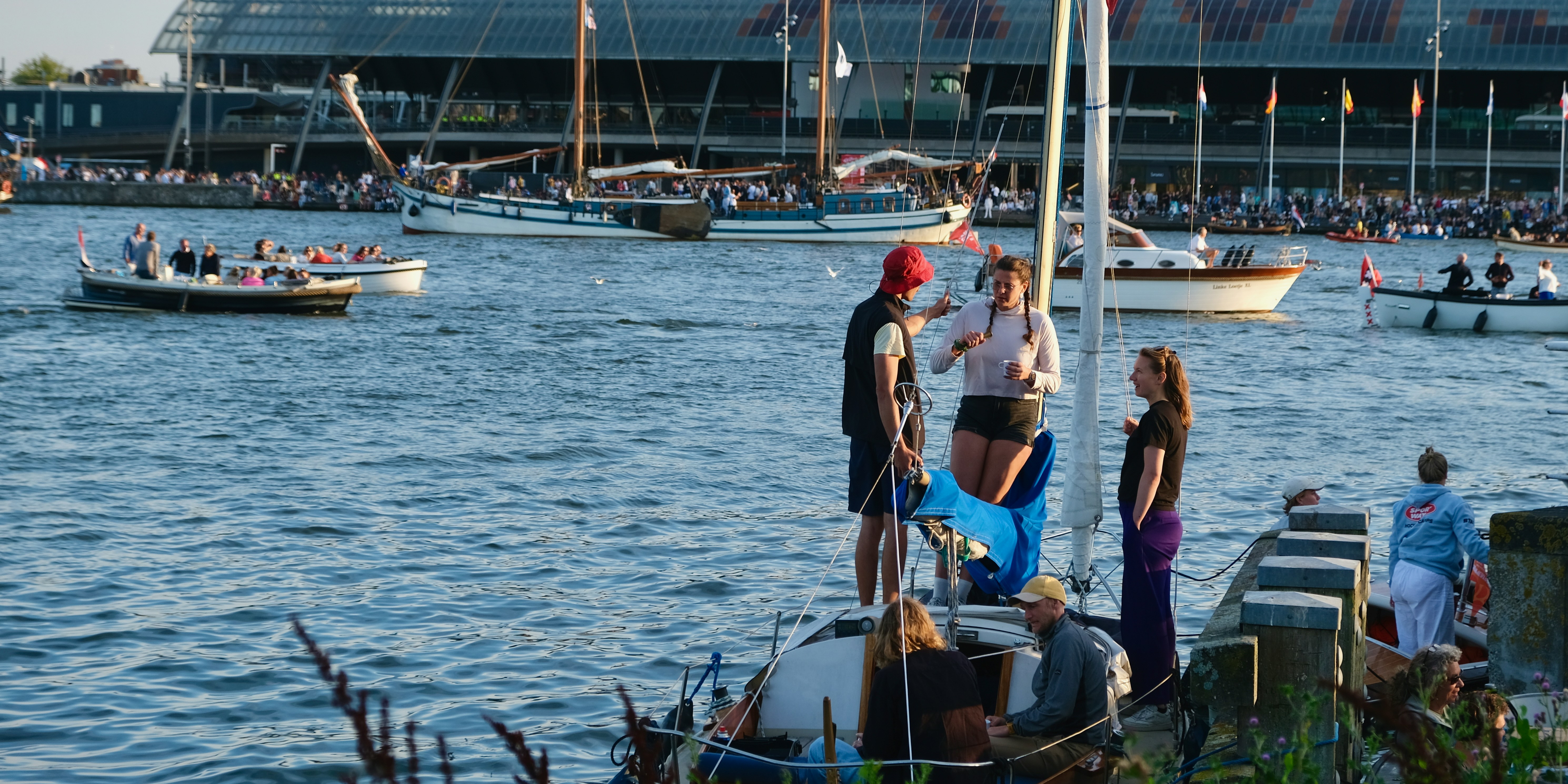 Dockside Portrait: Friends Chat by the Marina