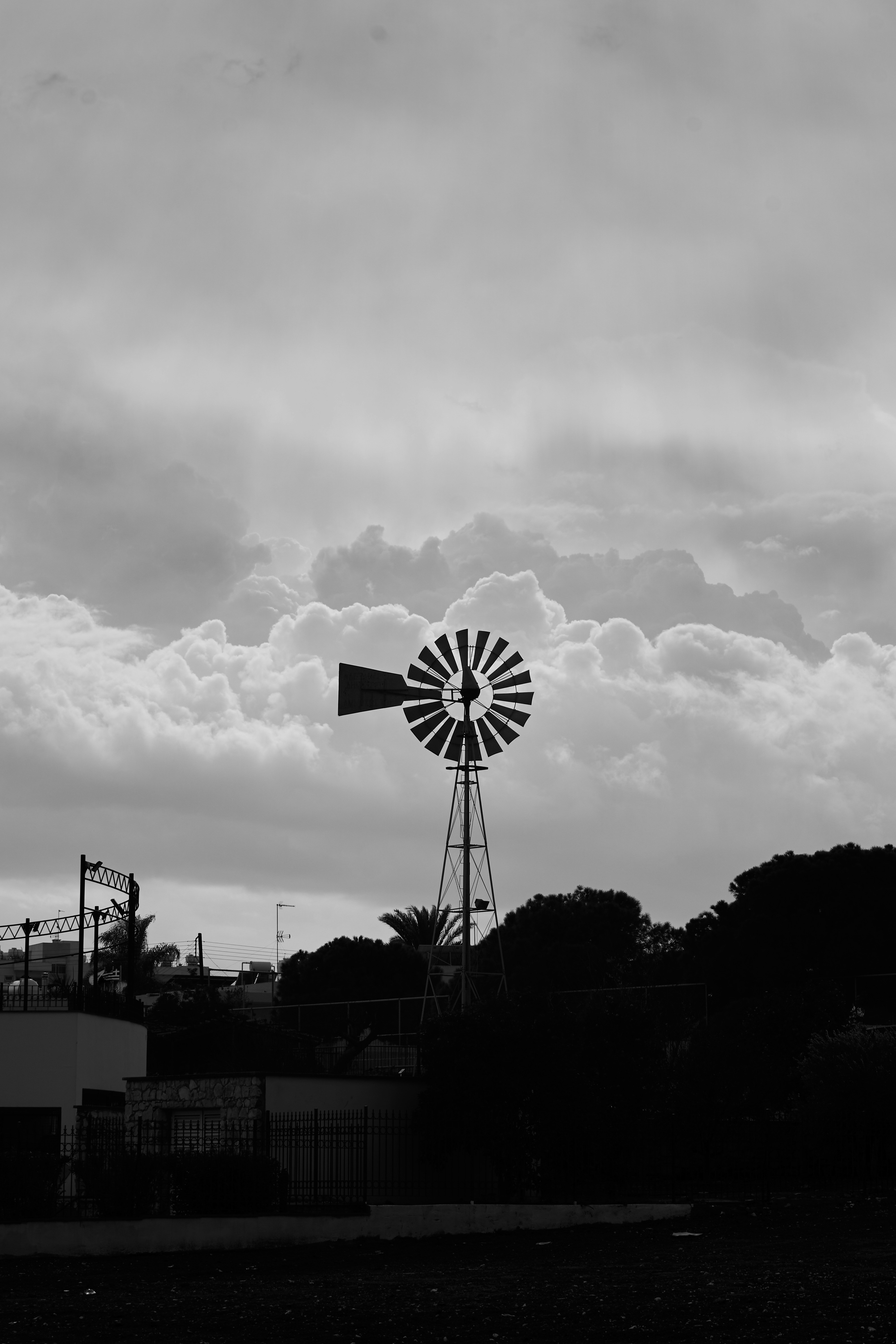 Silent Farmstead: A Windmill Above the Shadows
