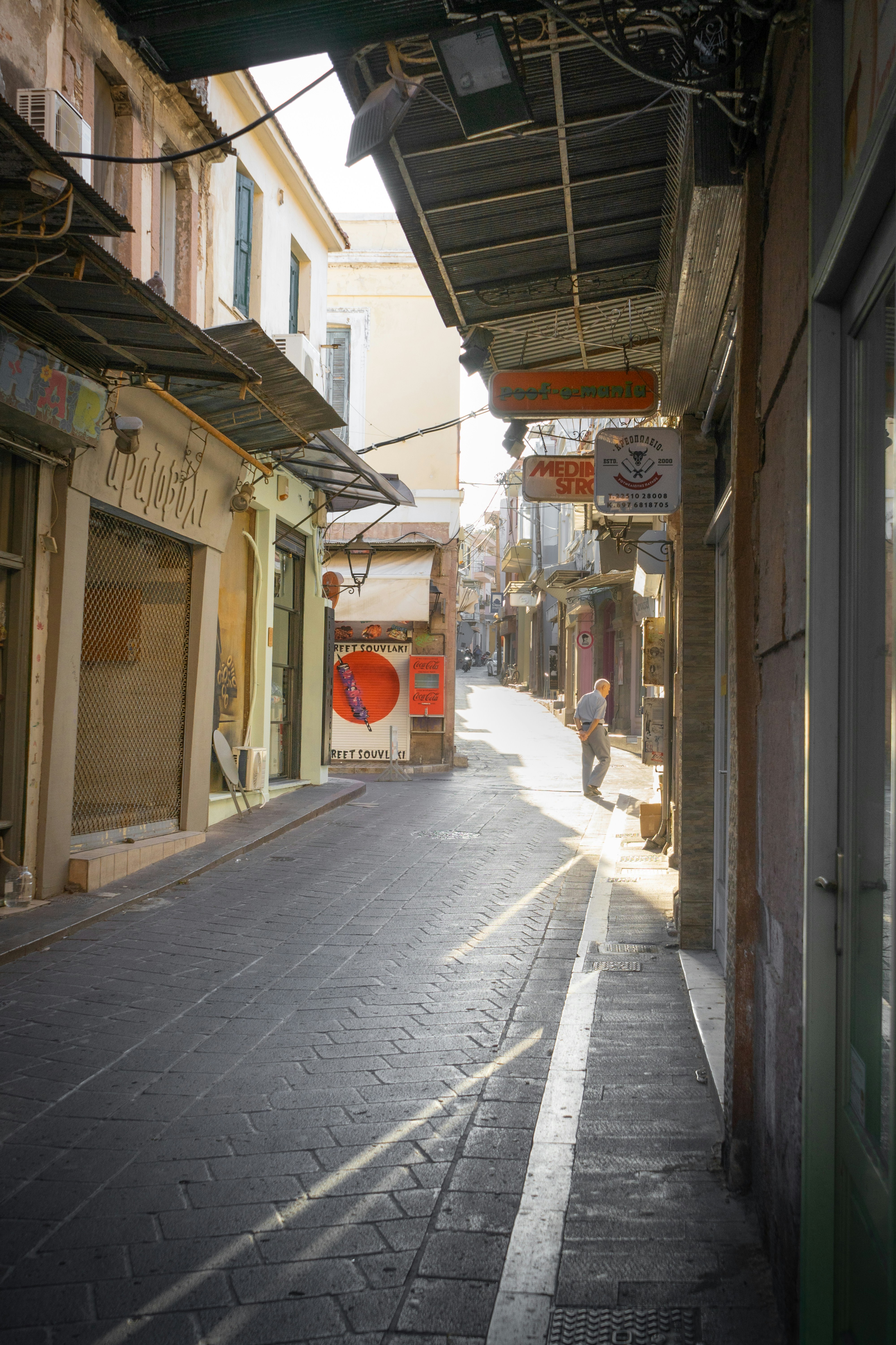 Shadowed Alleyway Turned Light Corridor