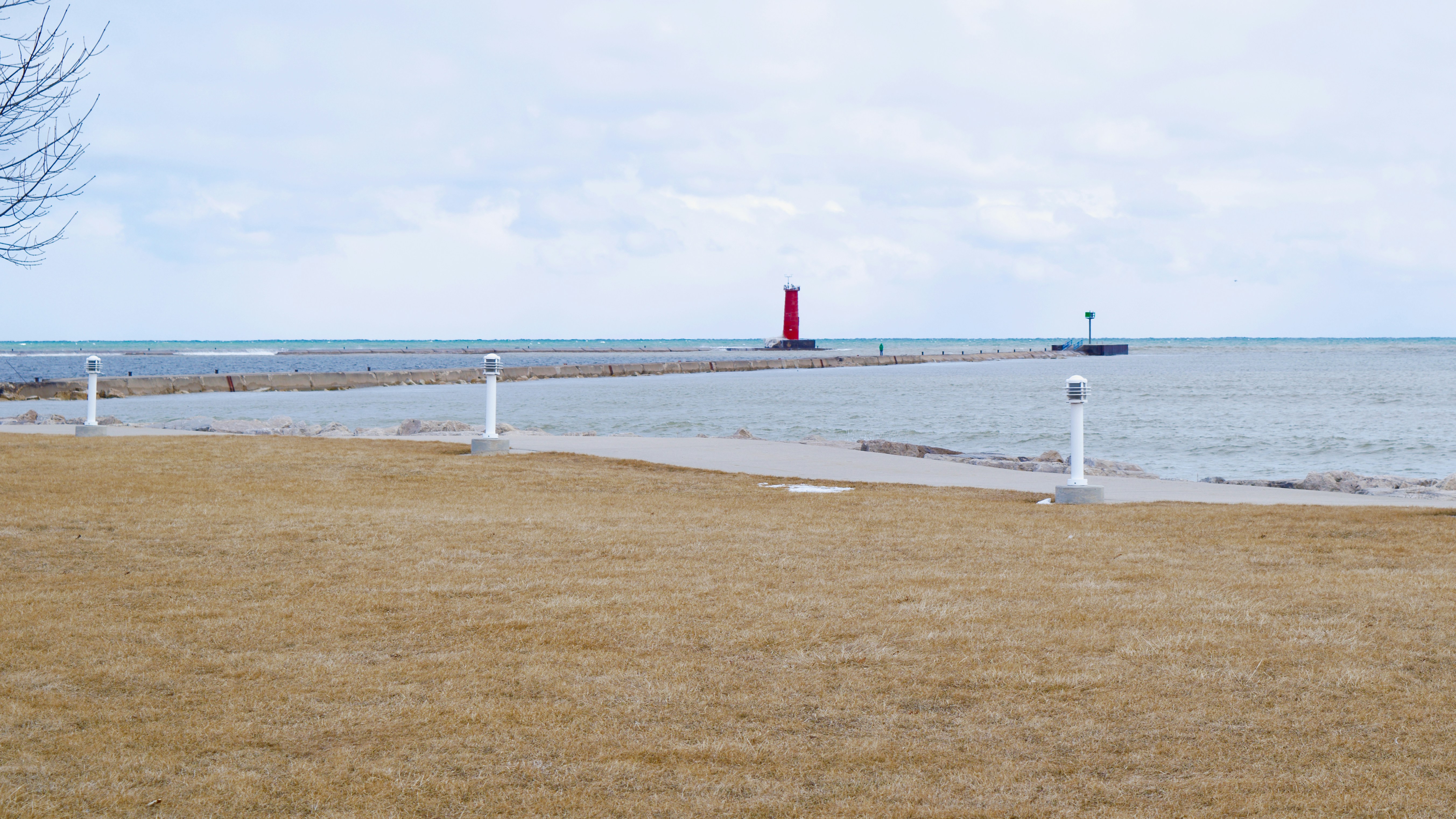 Lighthouse at the Edge: A Quiet Sea View from the Bare Shore