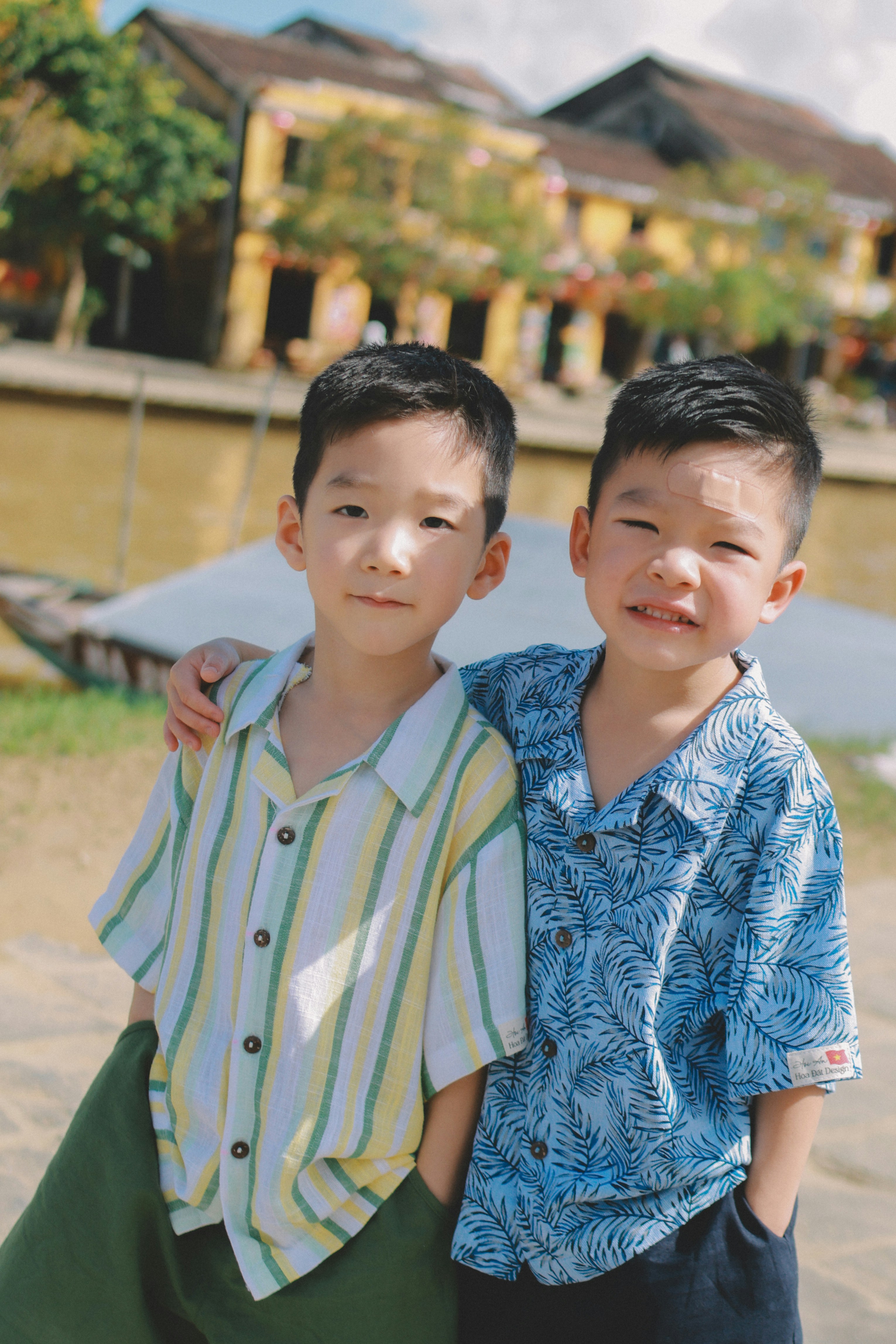 Two Friends in Sunny Colors by the Canal