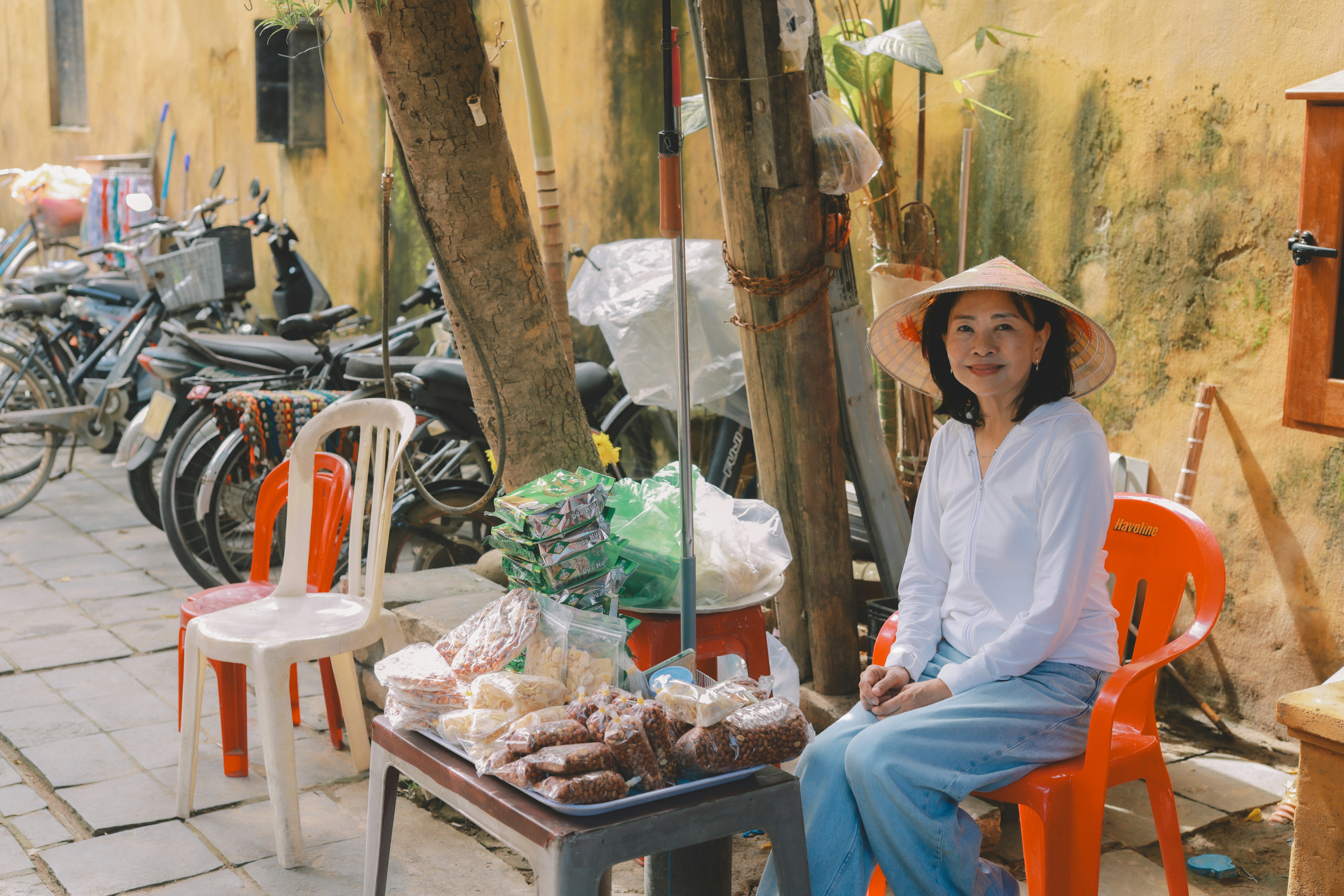 Street Vendor in a Sunlit Courtyard