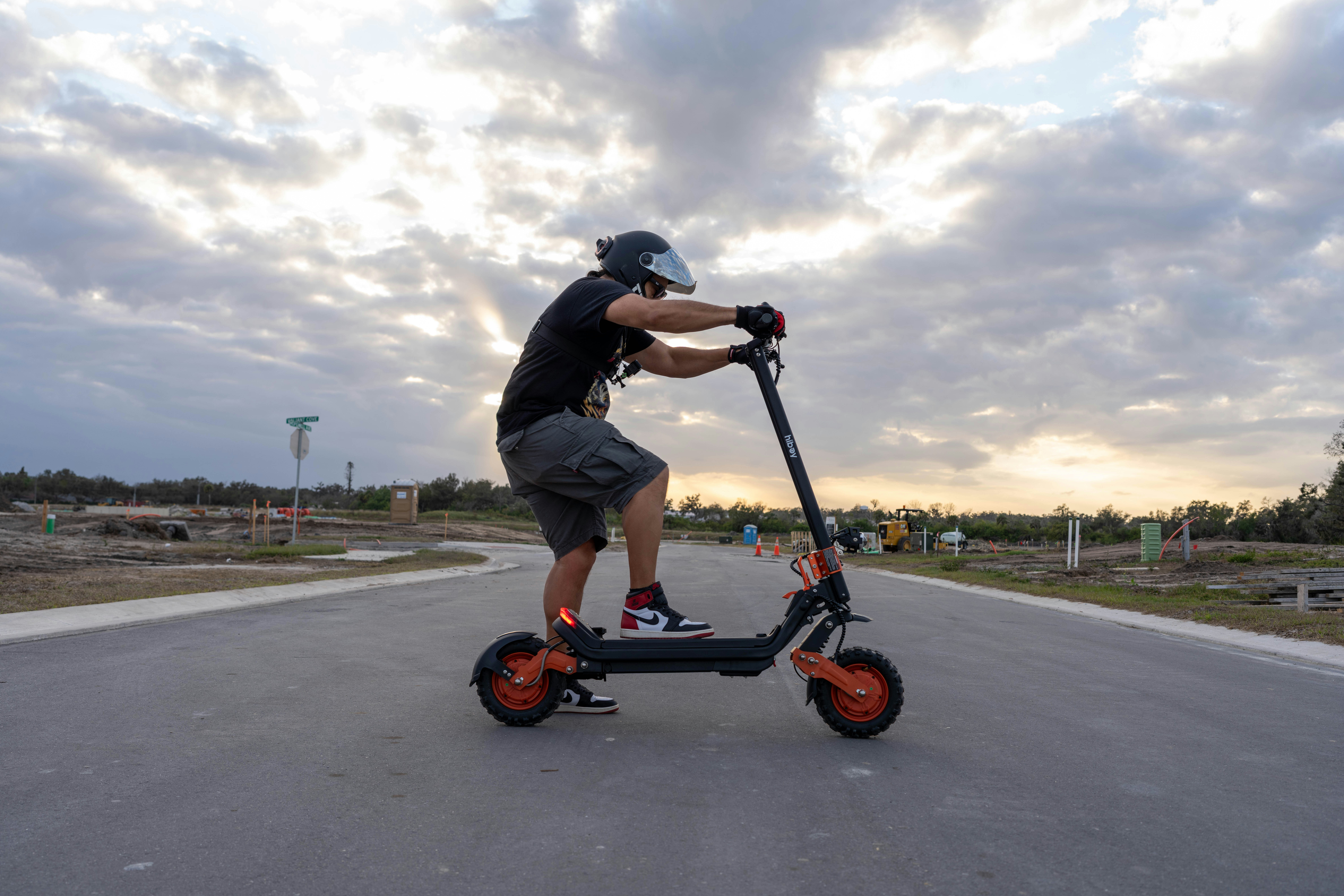 Rider in Focus: Streetboarder Rides Toward Sunset