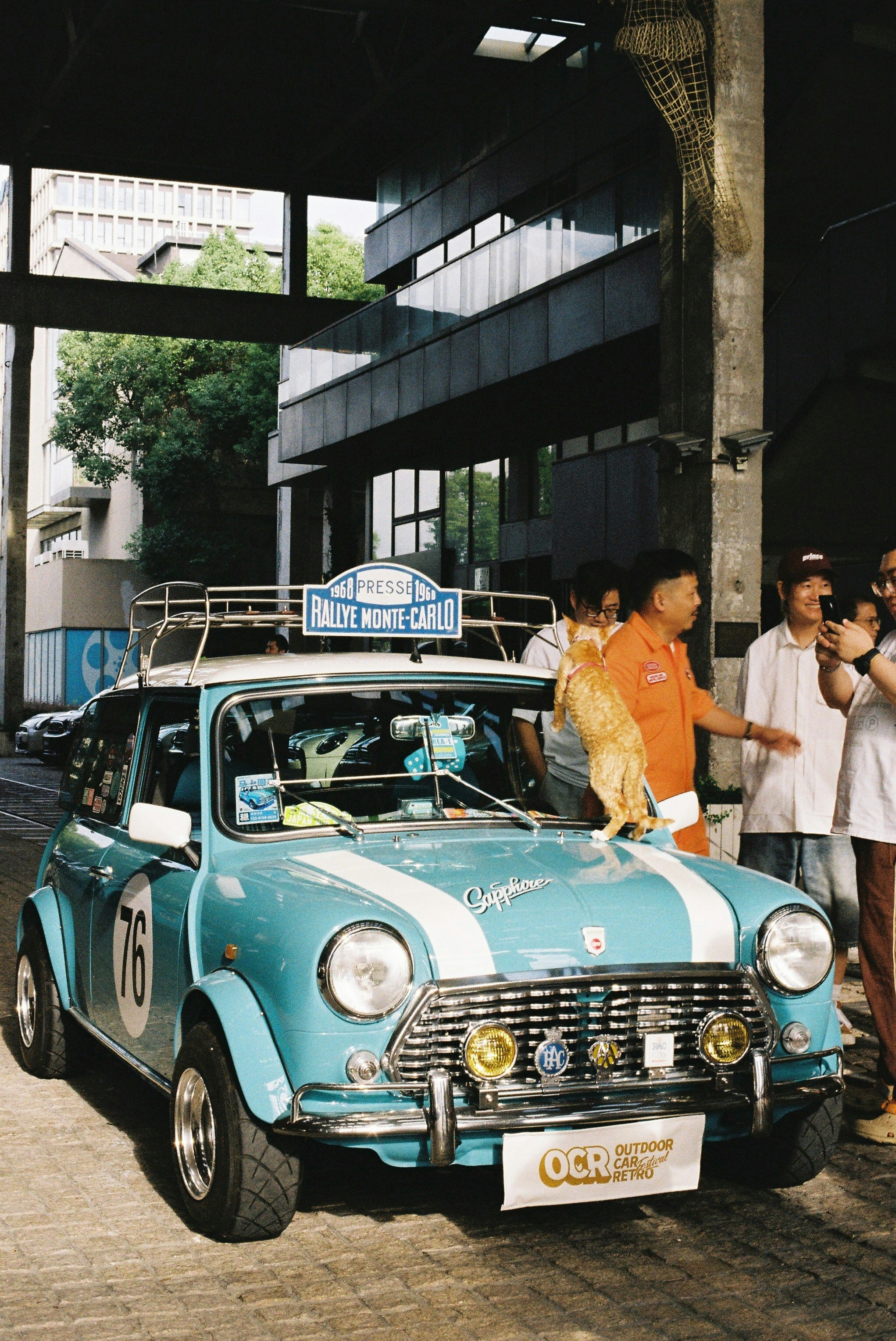 Blue Vintage Rally Car Under Industrial Canopy