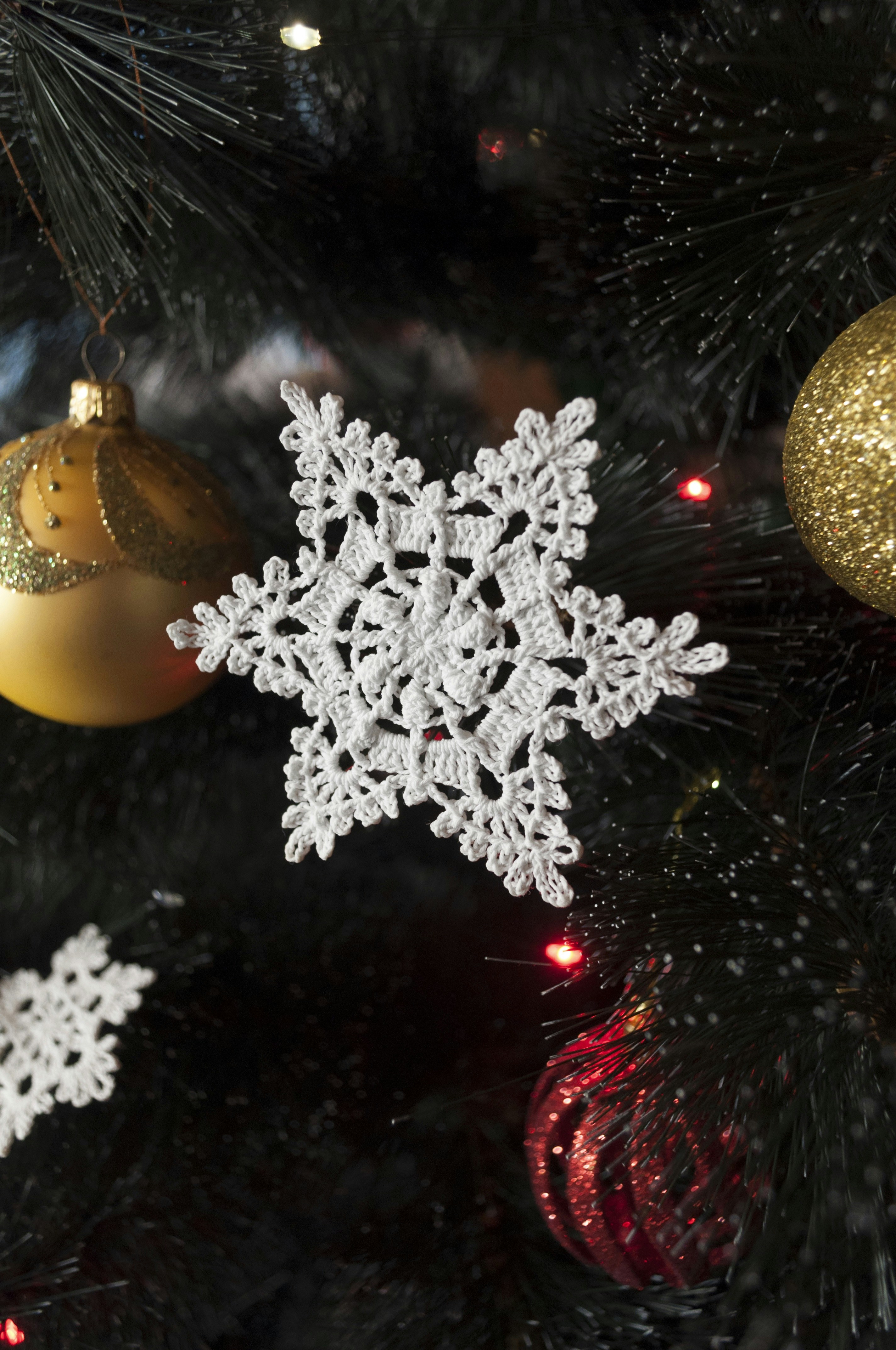 Snowflake Pendant on a Festive Christmas Tree