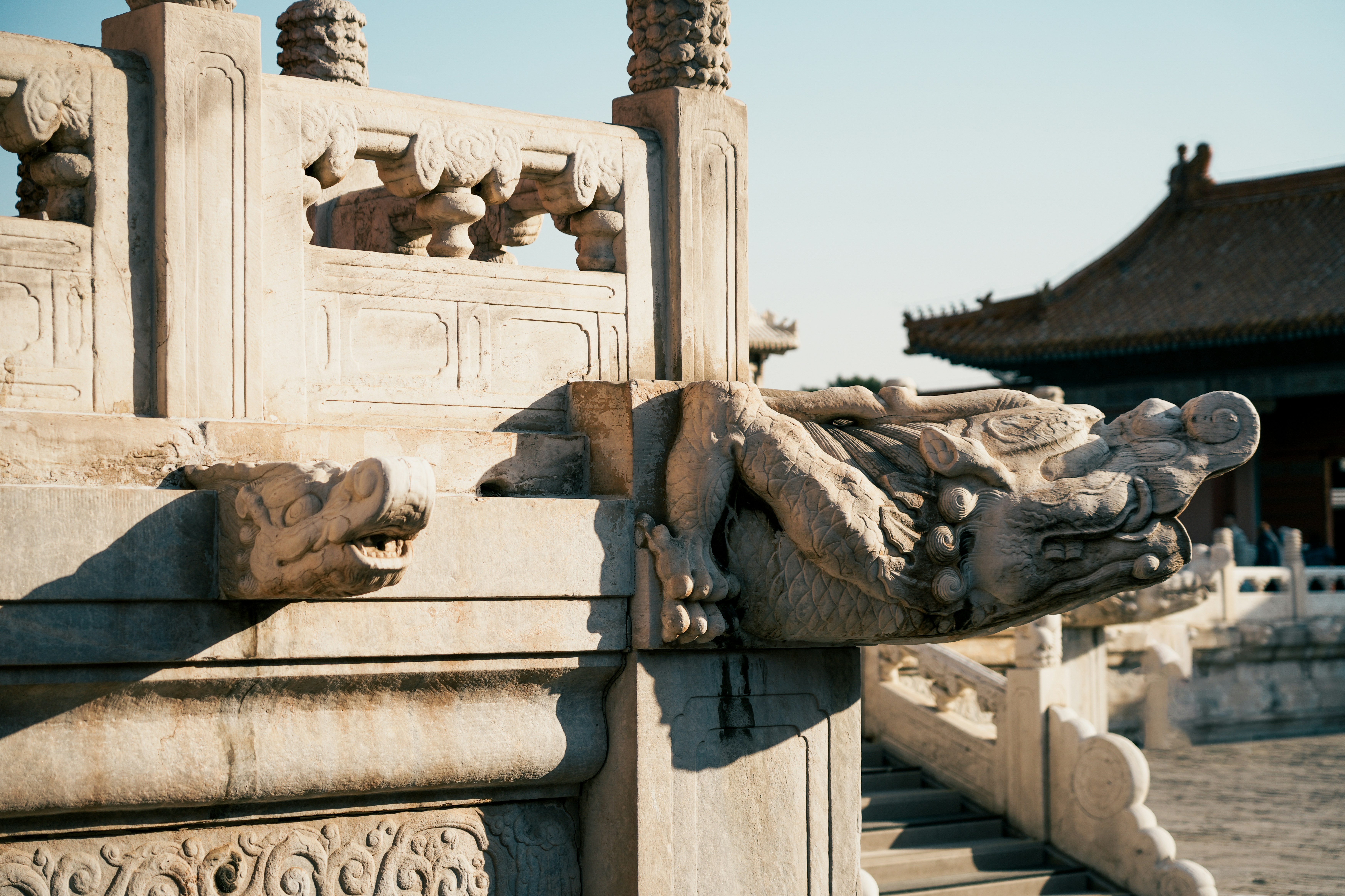 Dragonal Frieze: Carved Stone Guardians Guarding the Steps