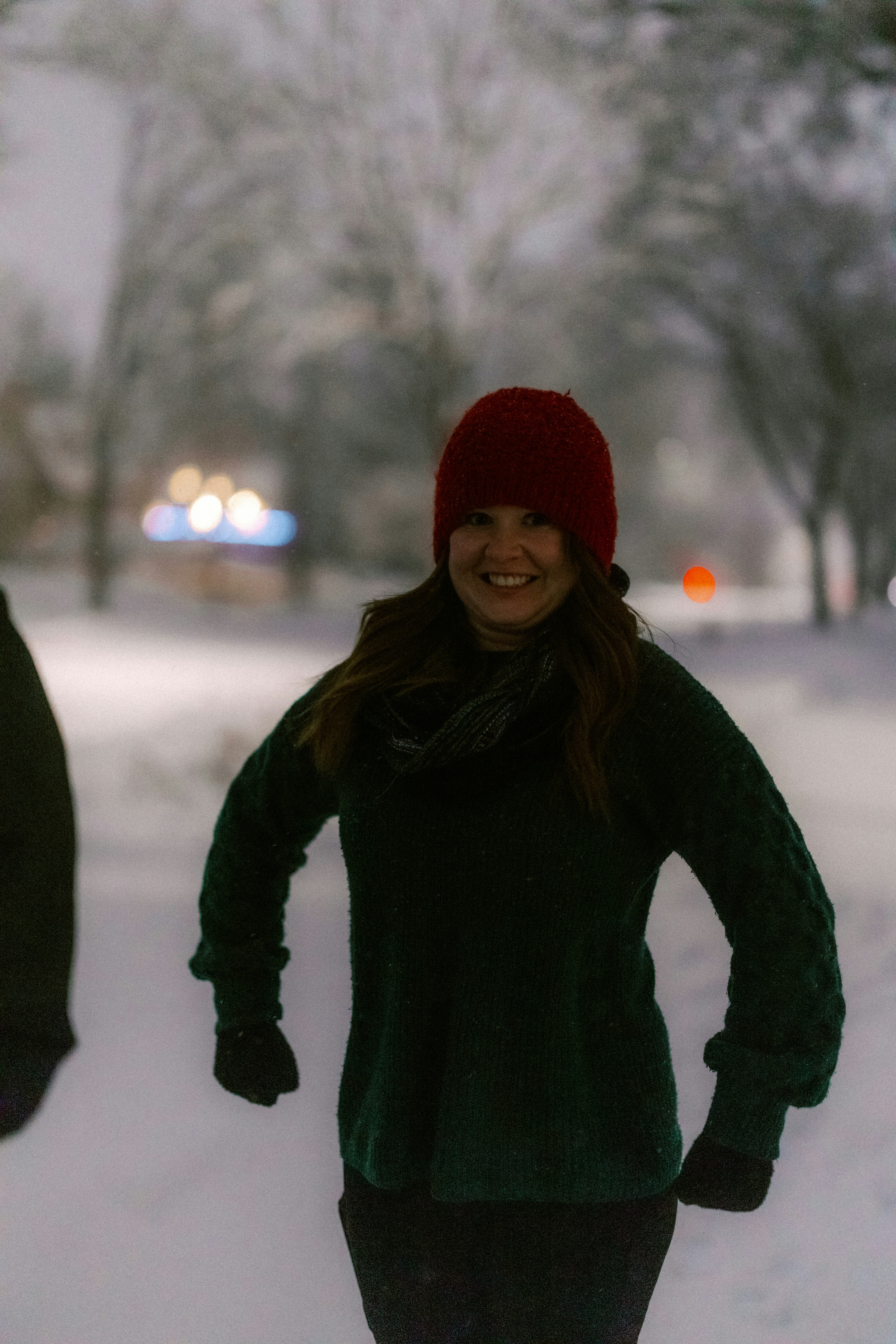 Red Knit, Warm Glow: A Snowy Stroll in Soft Focus