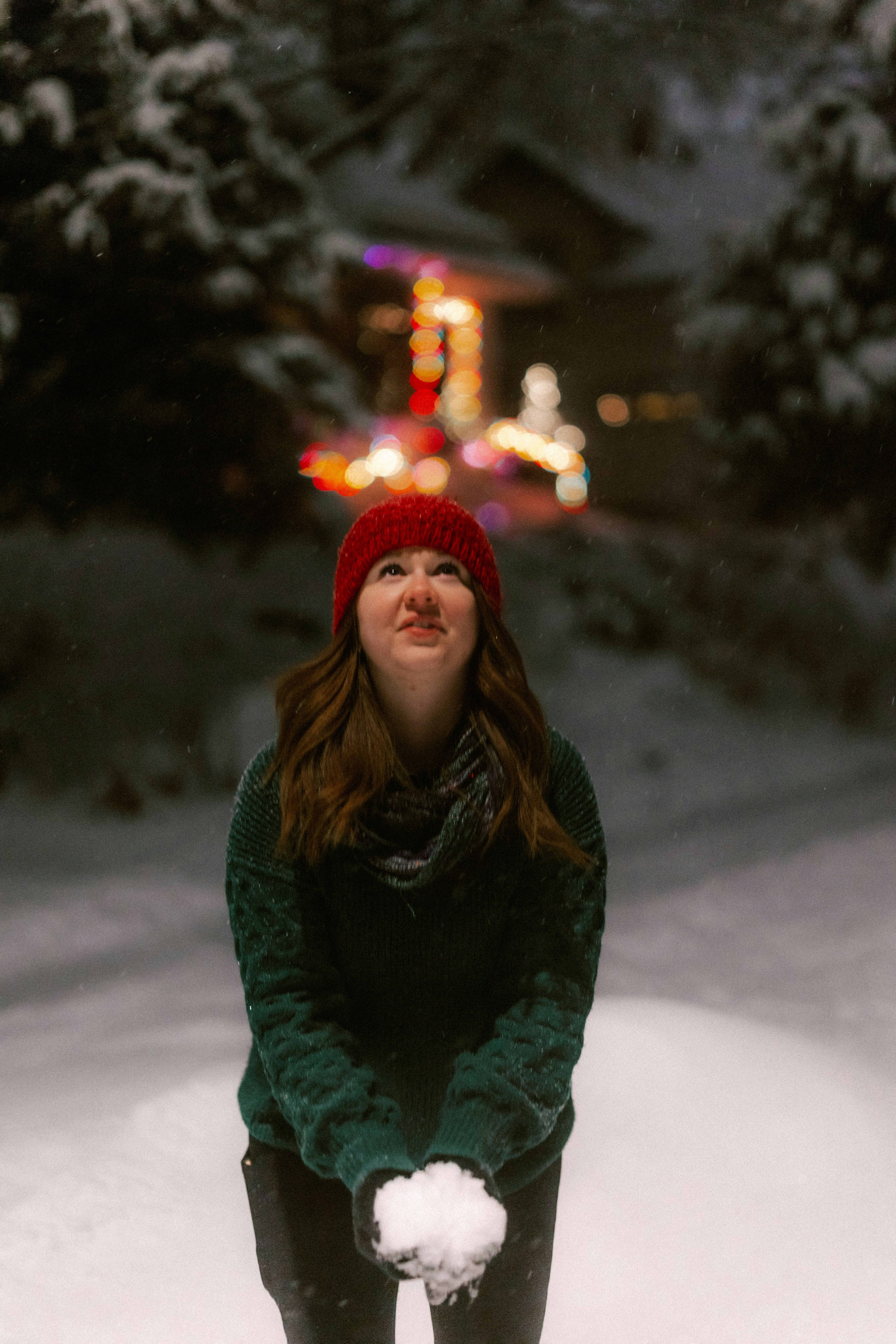 Winter Wish: A Youthful Smile Under Falling Snow