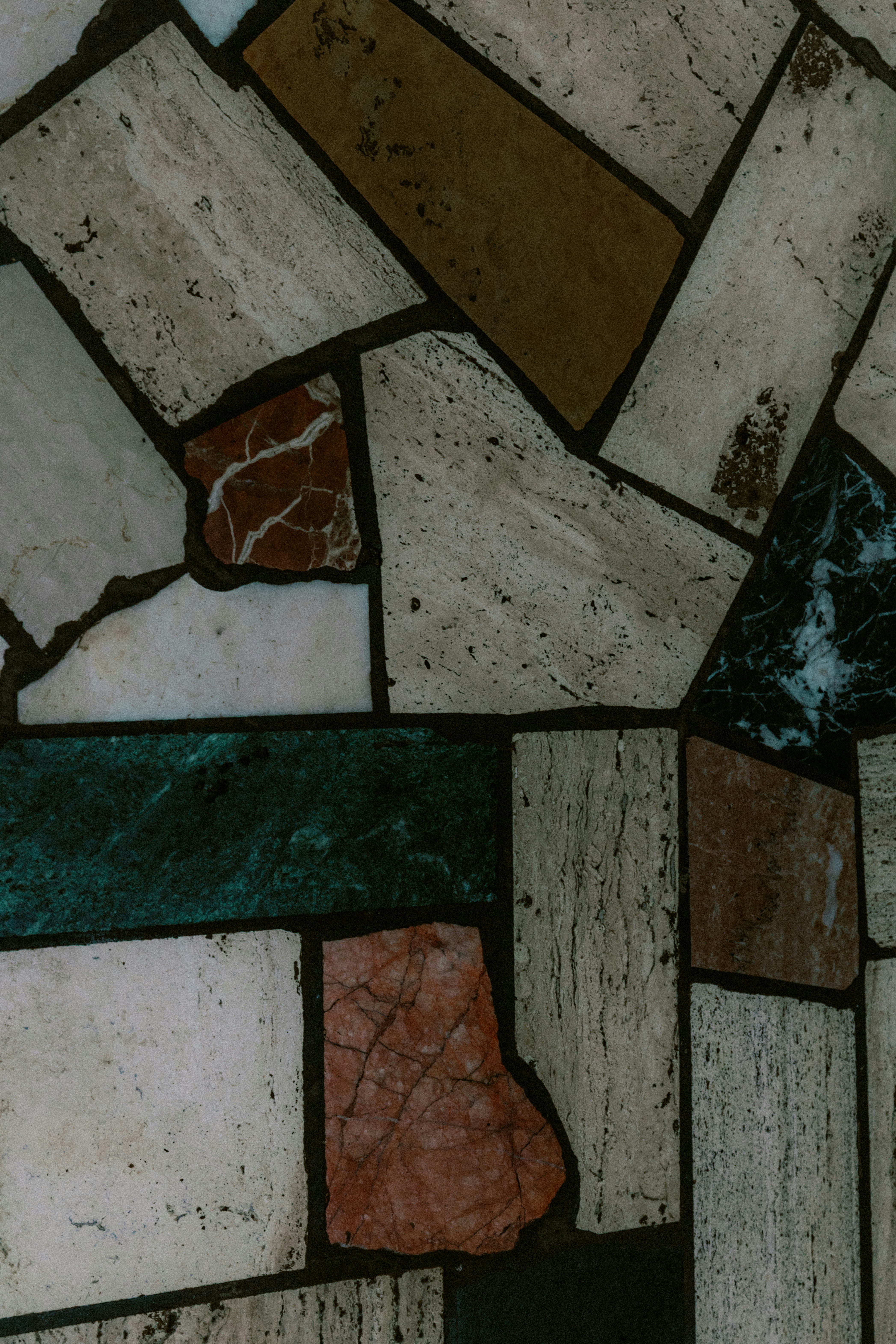 Stone Mosaic Portrait in Earthy Fragments