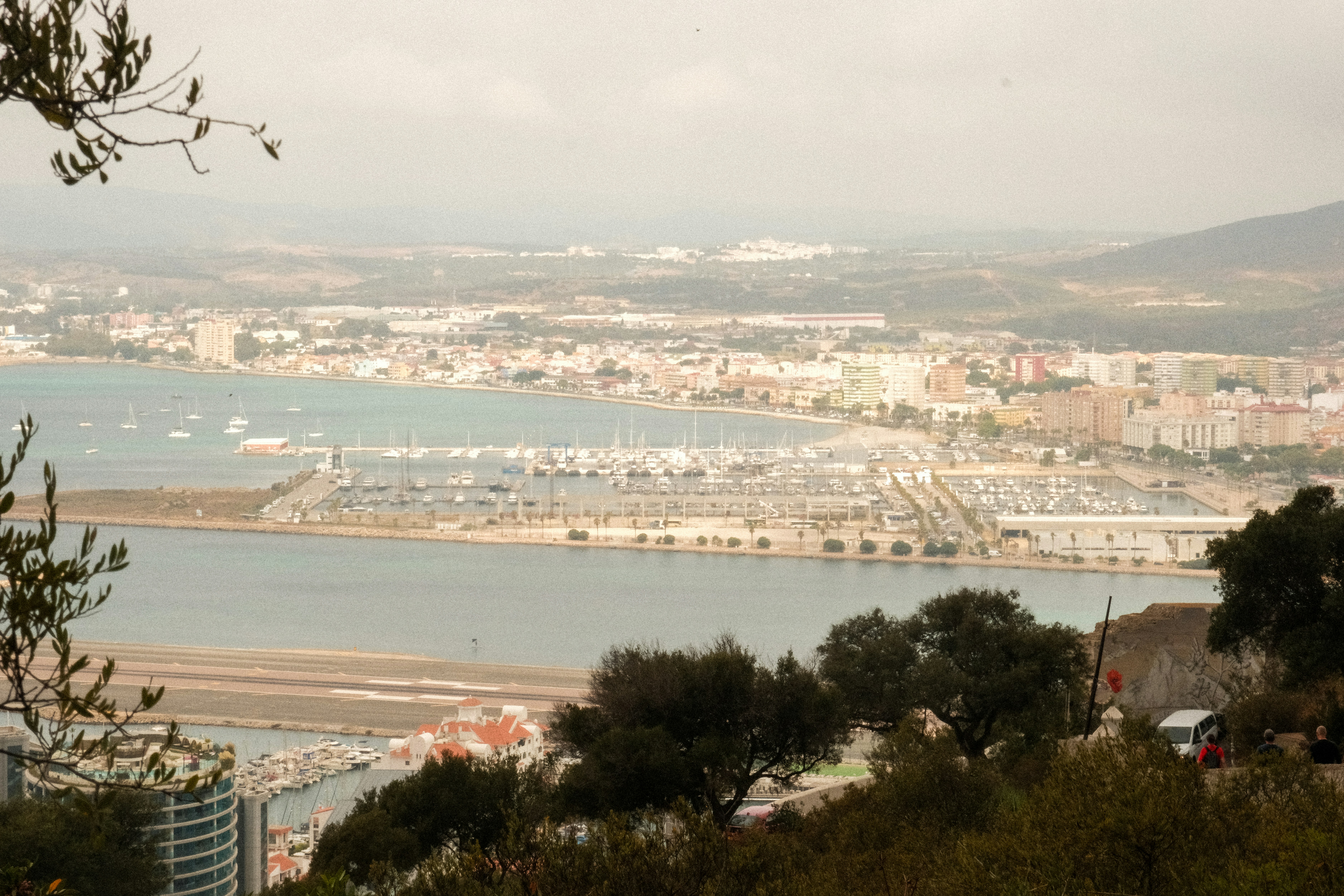Harbor Overlook: A Coastal Town Framed by Hills