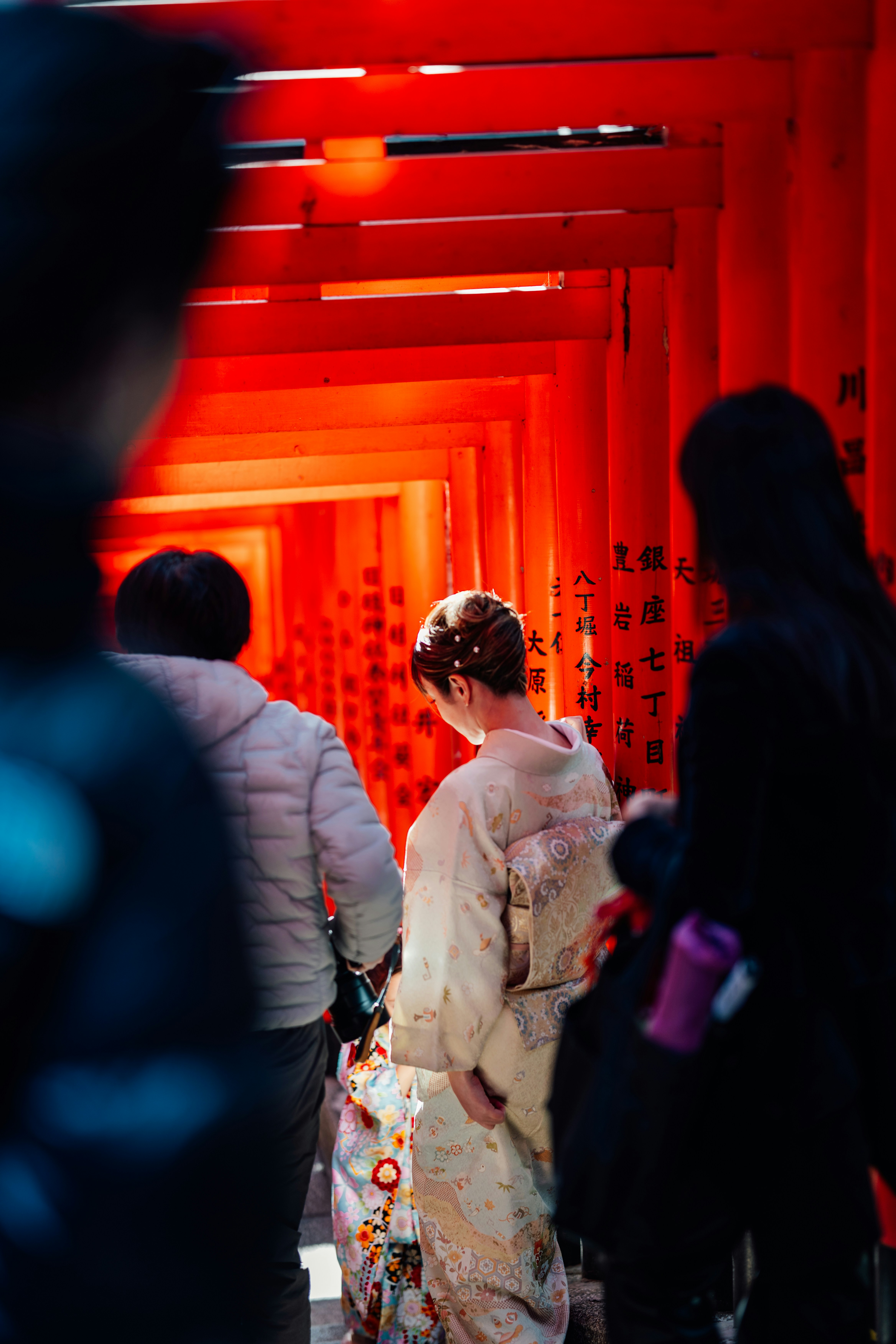 Crimson Corridor: A Kimono Moment Amid Lantern arches