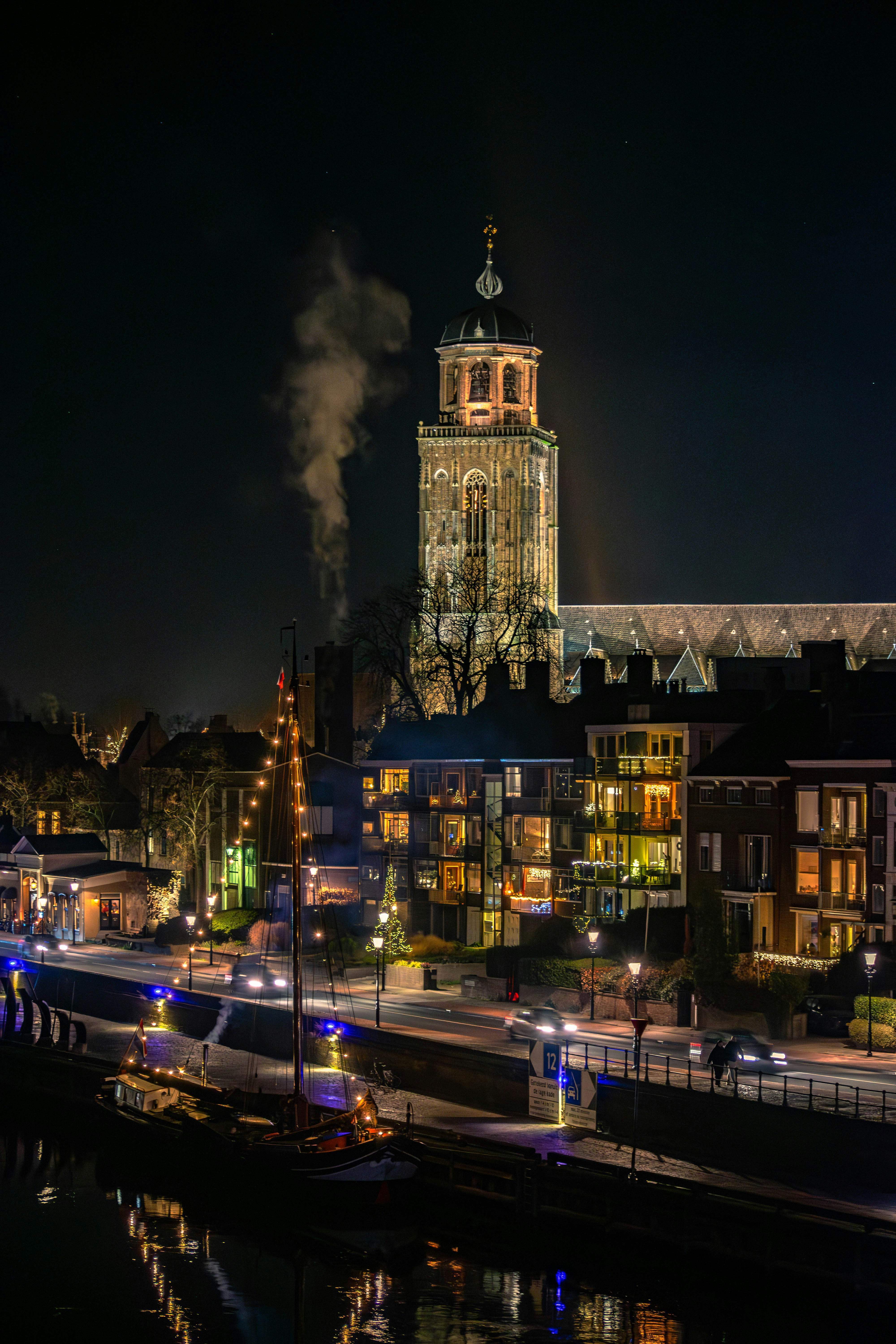 Harbor Cathedral at Night: Lantern-lit Village and Skyward Bell Tower